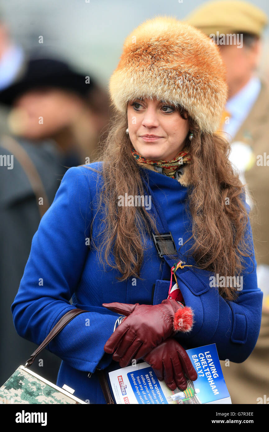 Racegoers soak up the atmosphere during Gold Cup Day at Cheltenham ...