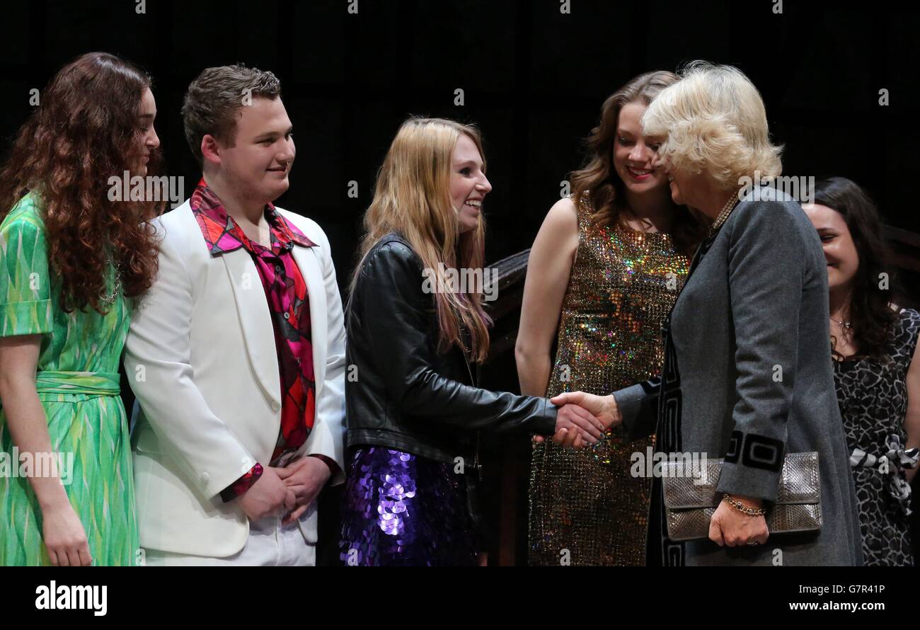 The Duchess of Cornwall meets performers on stage during a visit to the ...