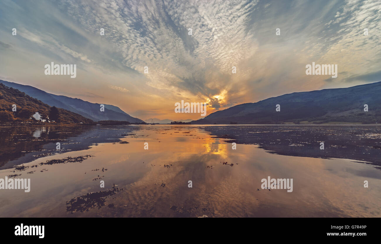Sunset over Loch Leven Harbour in Scottish Highlands Stock Photo - Alamy