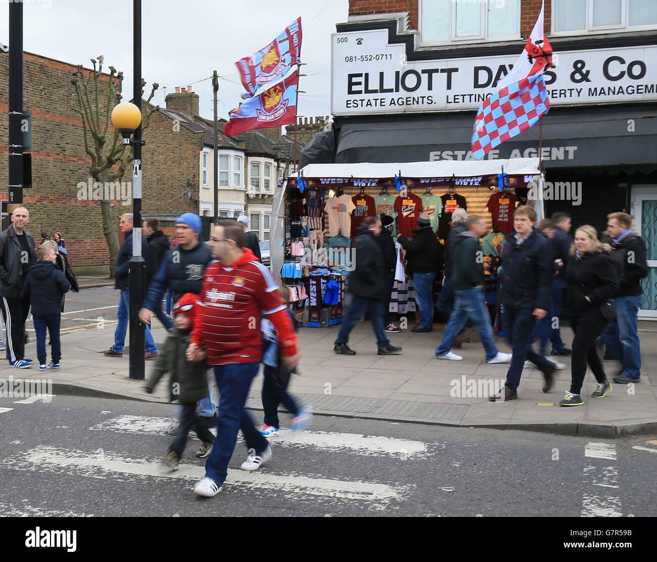 West Ham United supporters walk to Upton Park for the game against ...