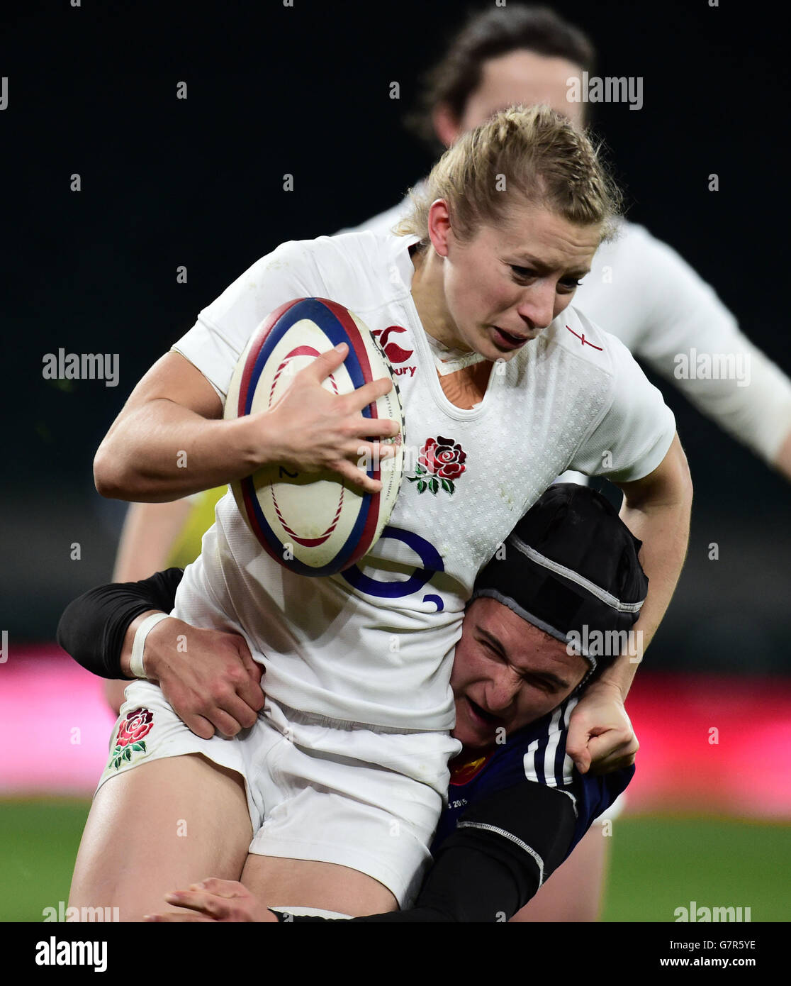 England's Fiona Pocock is tackled by France's Shannon Izar during the ...