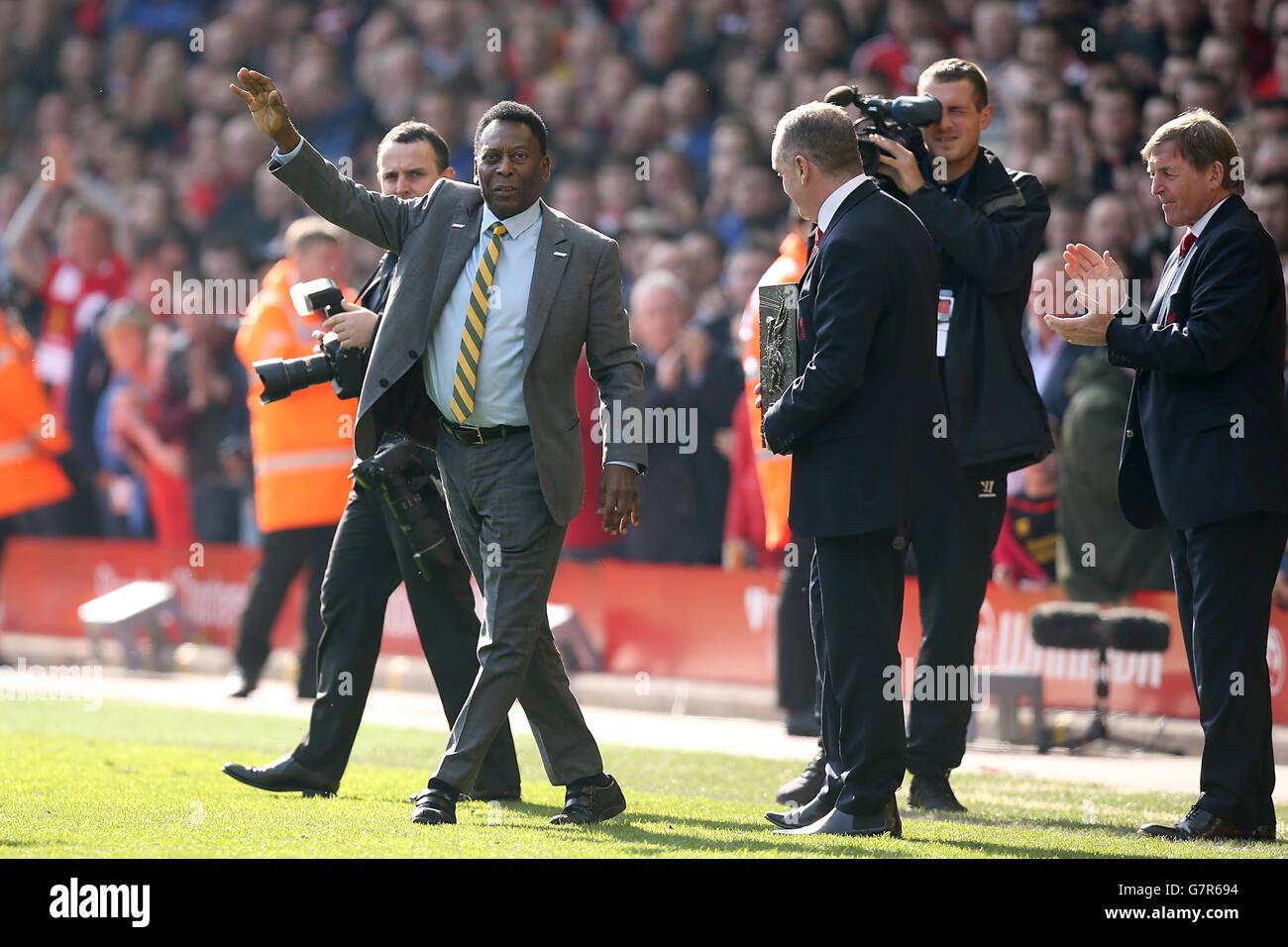 Football legend Pele is introduced to the fans at half-time during the ...