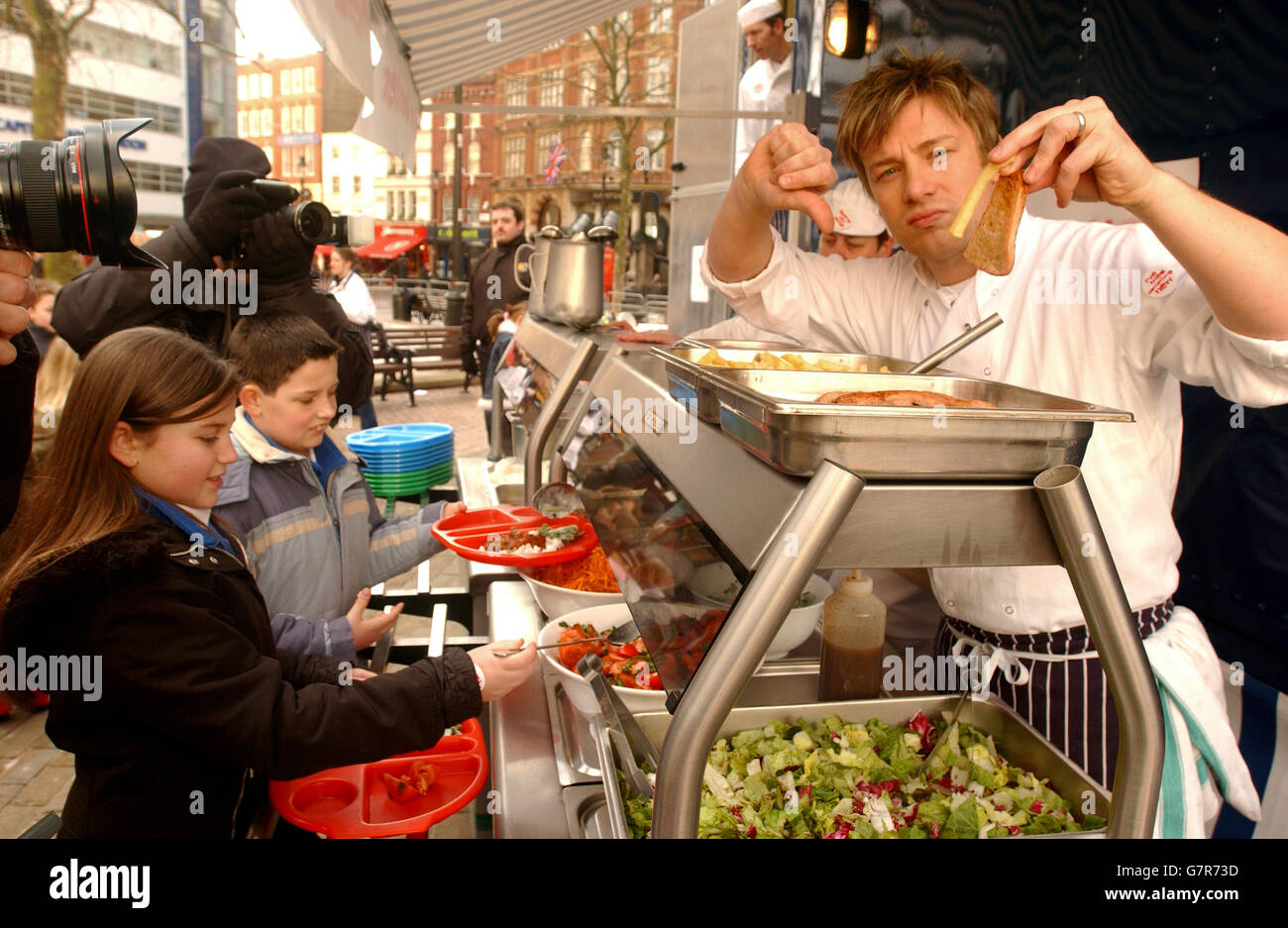 Jamie Oliver Serves Dinners To Children High Resolution Stock ...