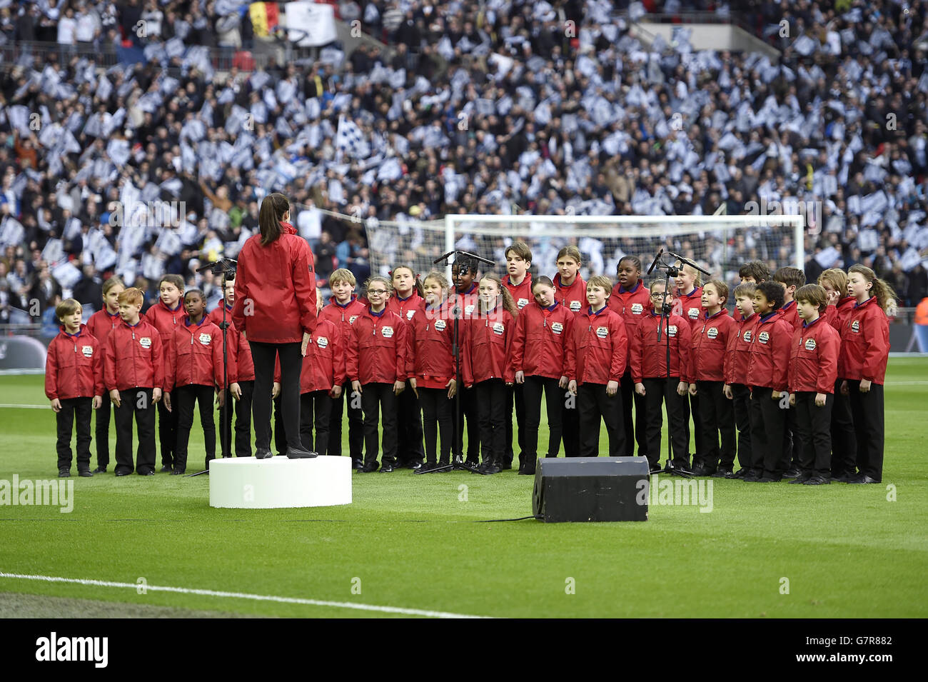 A children's choir performs before kick off at Wembley Stock Photo - Alamy