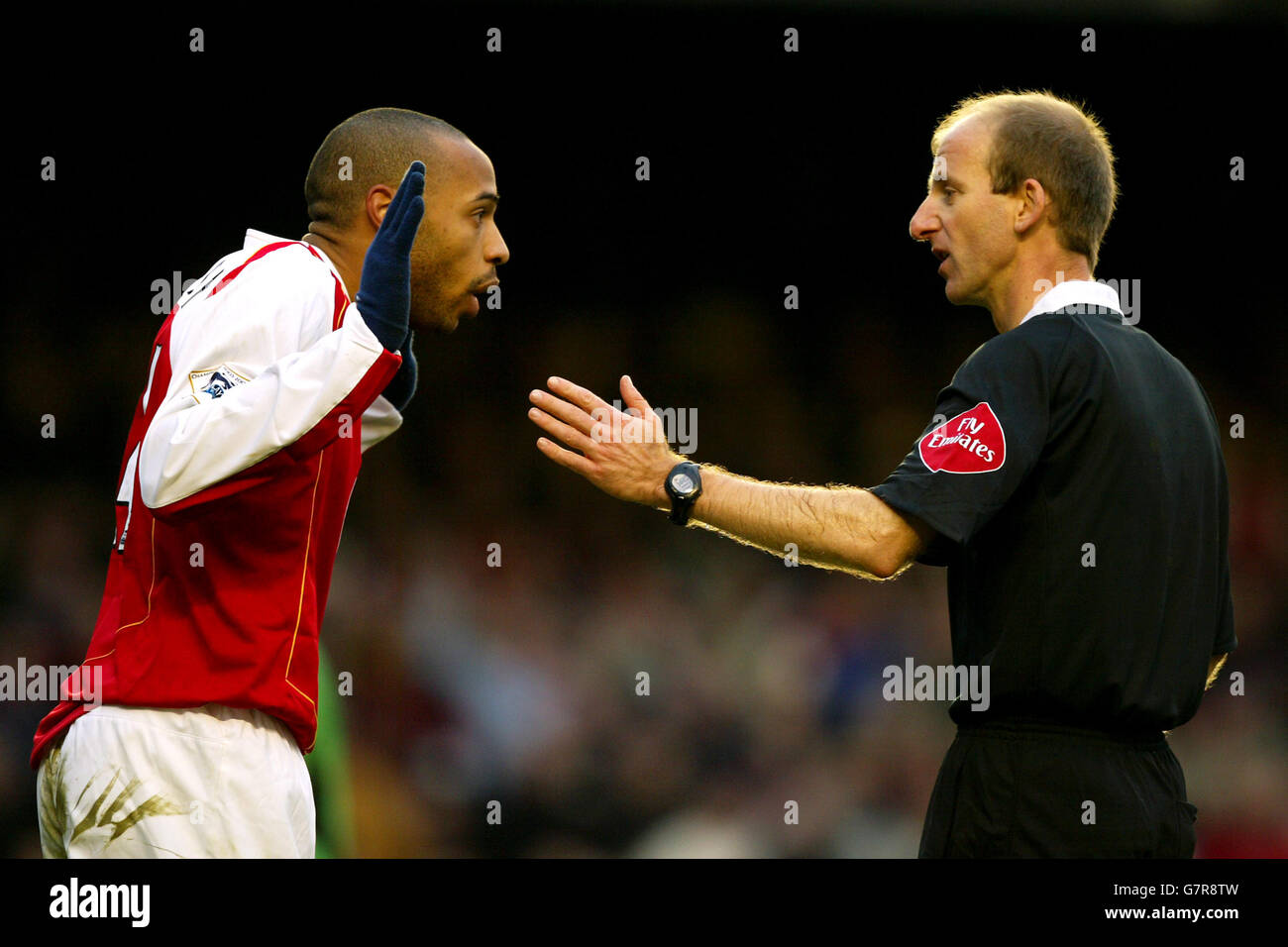 Arsenal's Thierry Henry argues with referee Mike Riley after his goal ...