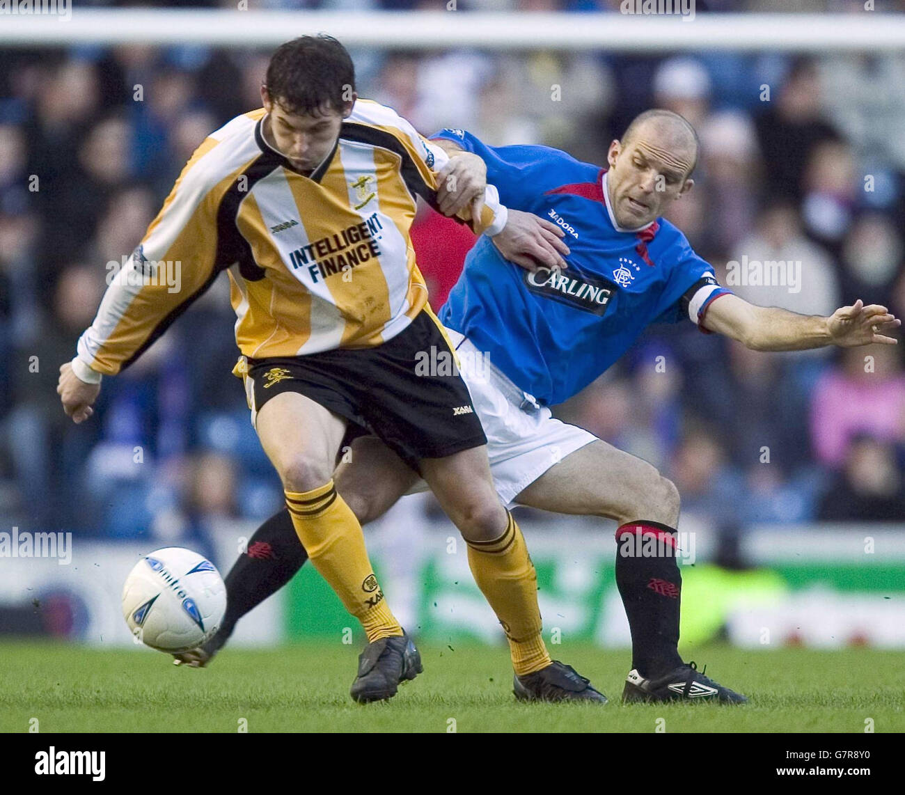 Livingston's Jamie Hand (L) and Rangers Alex Rae in action Stock Photo ...