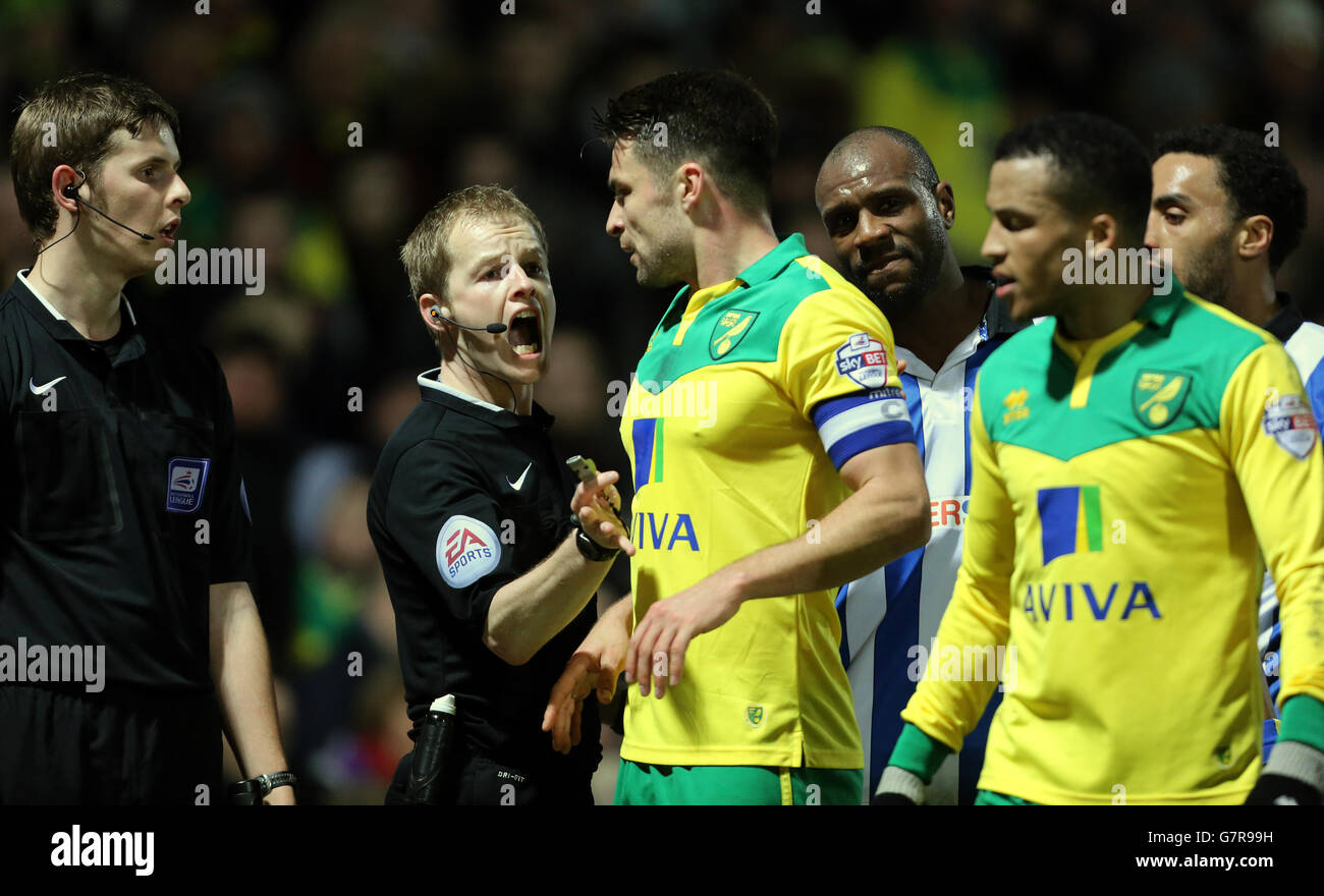 Assistant Referee Alan Dale and Referee Gavin Ward has a word with ...