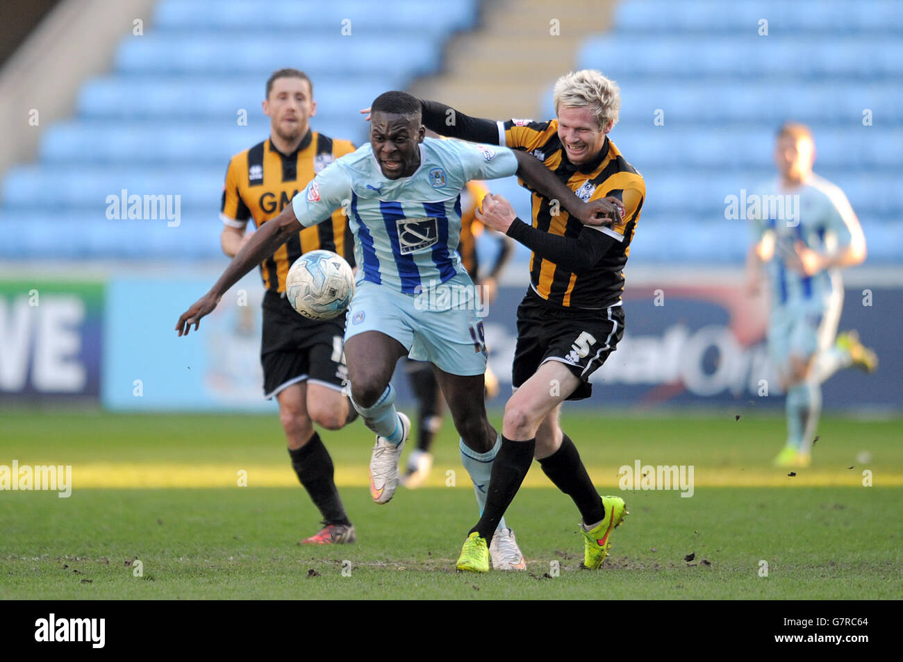 Coventry City's Frank Nouble is challenged by Port Vale's Ryan McGivern ...