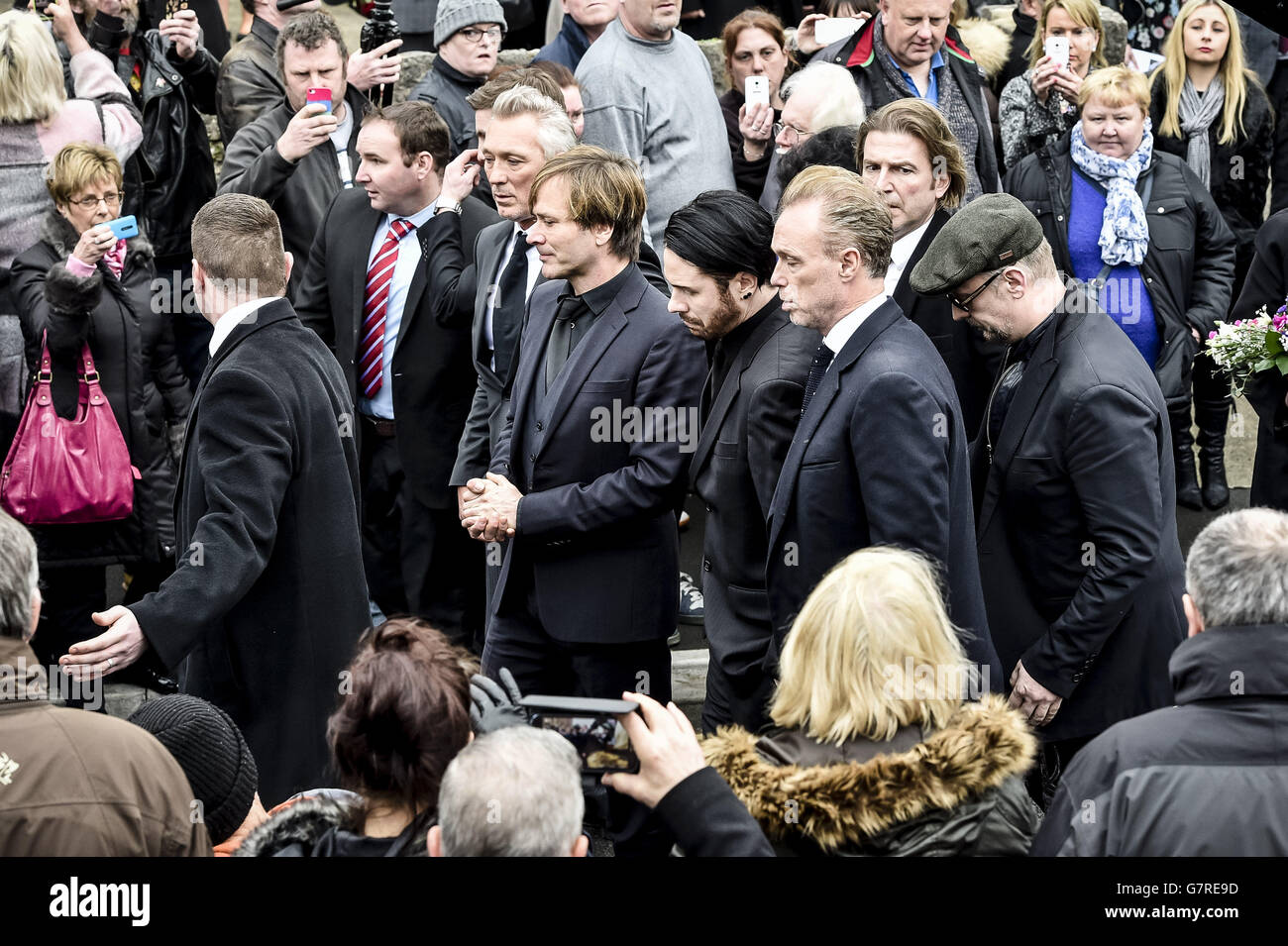 Members of Spandau Ballet and Boy George (right in hat) after the ...