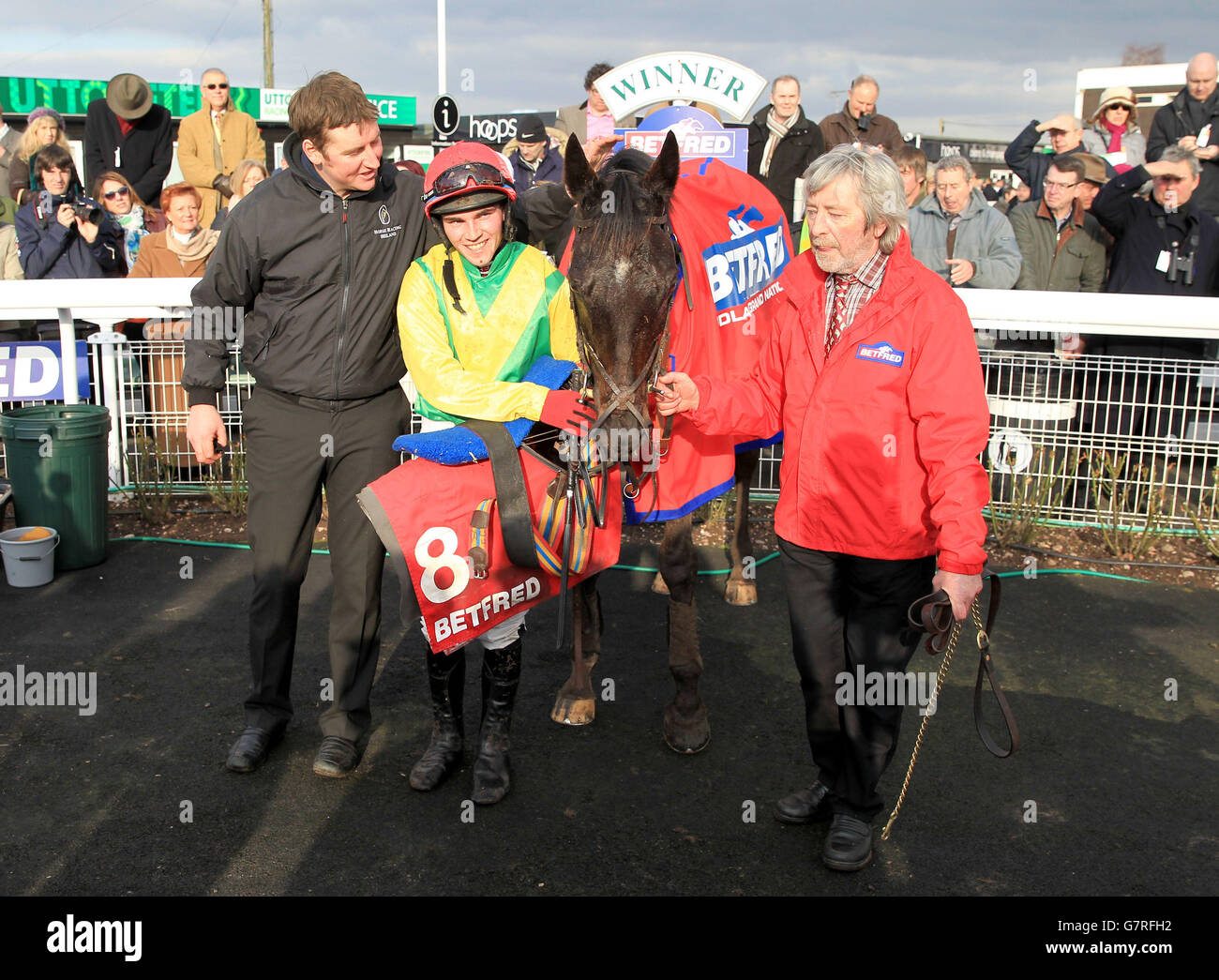 Jonathan Burke celebrates winning The Betfred Midlands Grand National ...