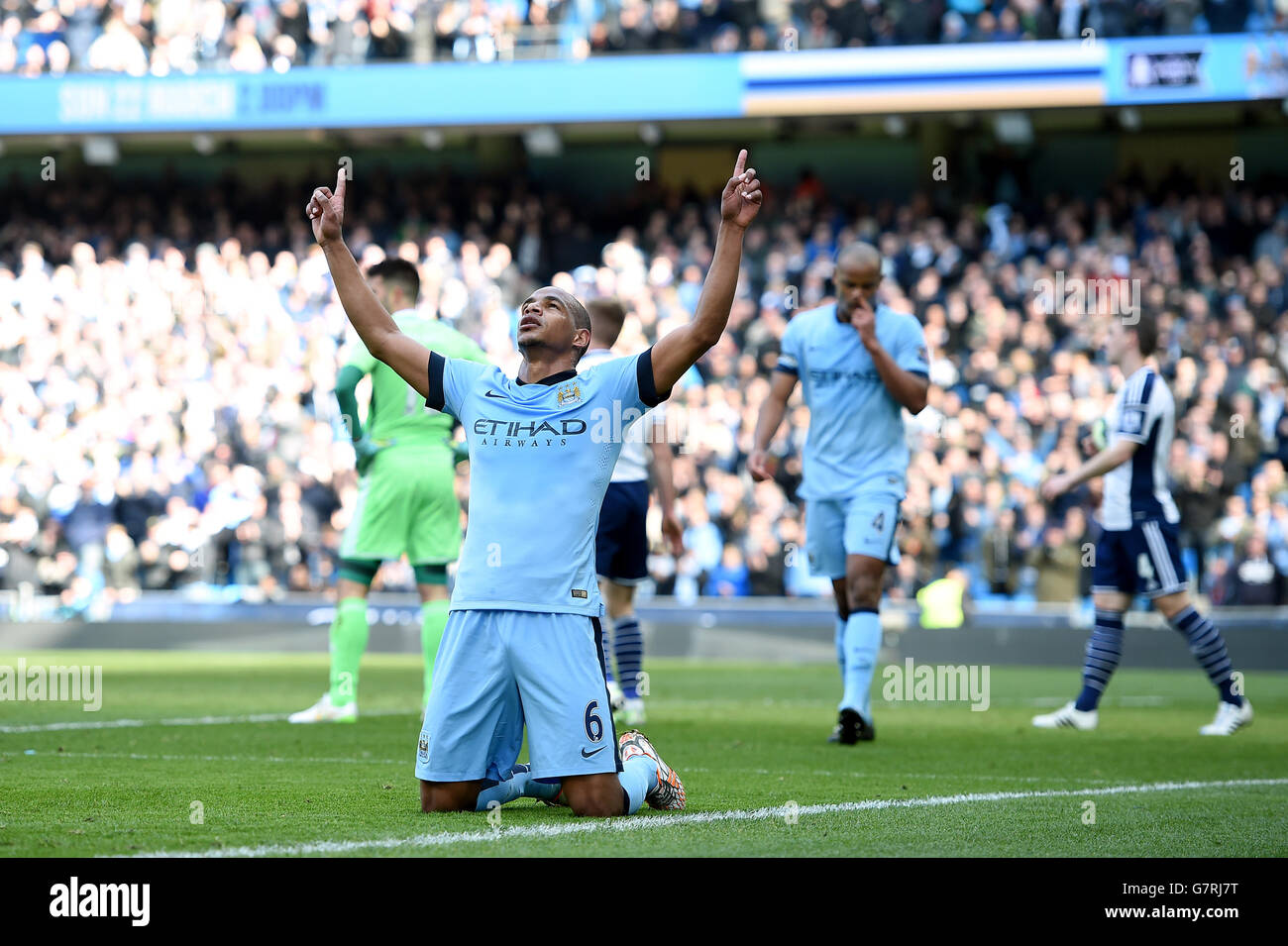 Manchester City's Fernando (left) celebrates scoring their second goal ...