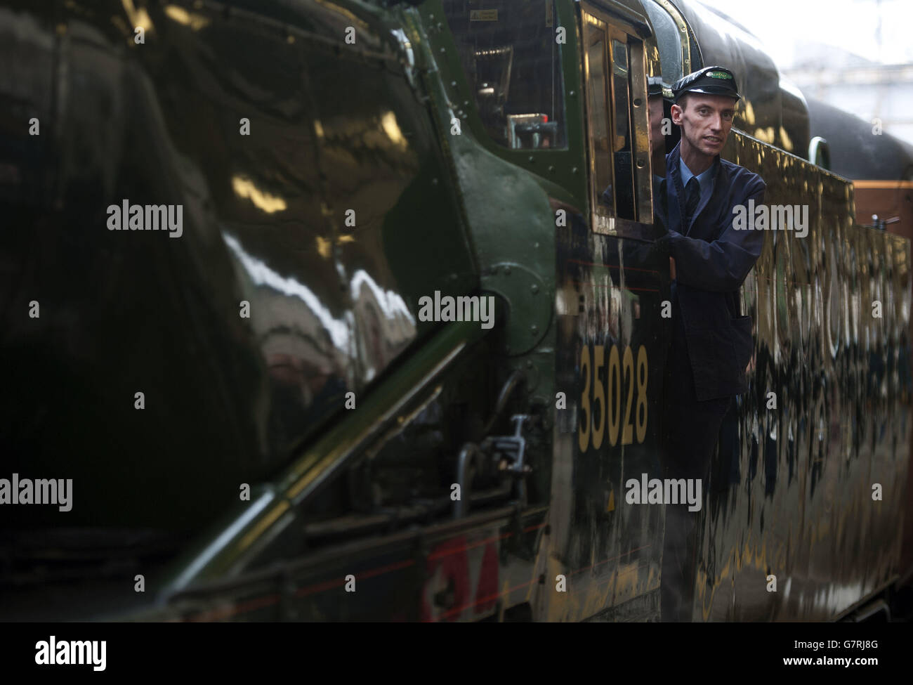 Youngest steam engine driver in half a century Stock Photo - Alamy