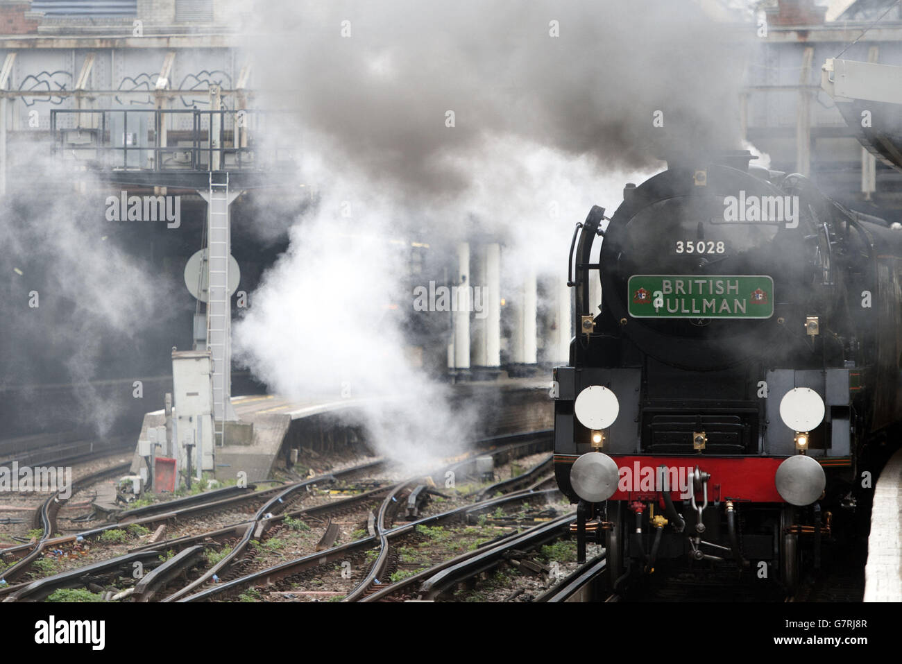Youngest steam engine driver in half a century Stock Photo - Alamy