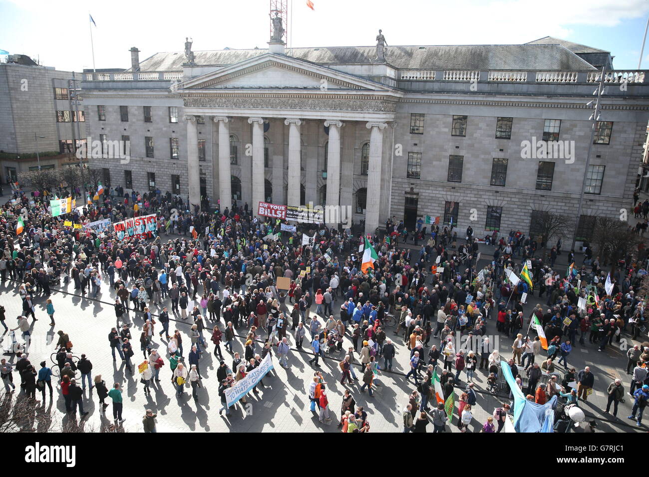 Protesters march past the General Post Office during a demonstration ...