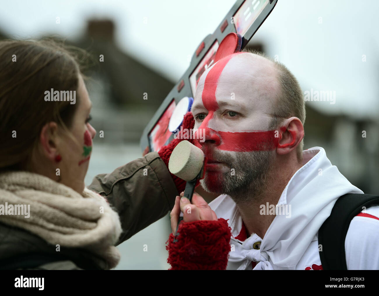 An England fan gets his face painted before the 2015 RBS Six Nations ...