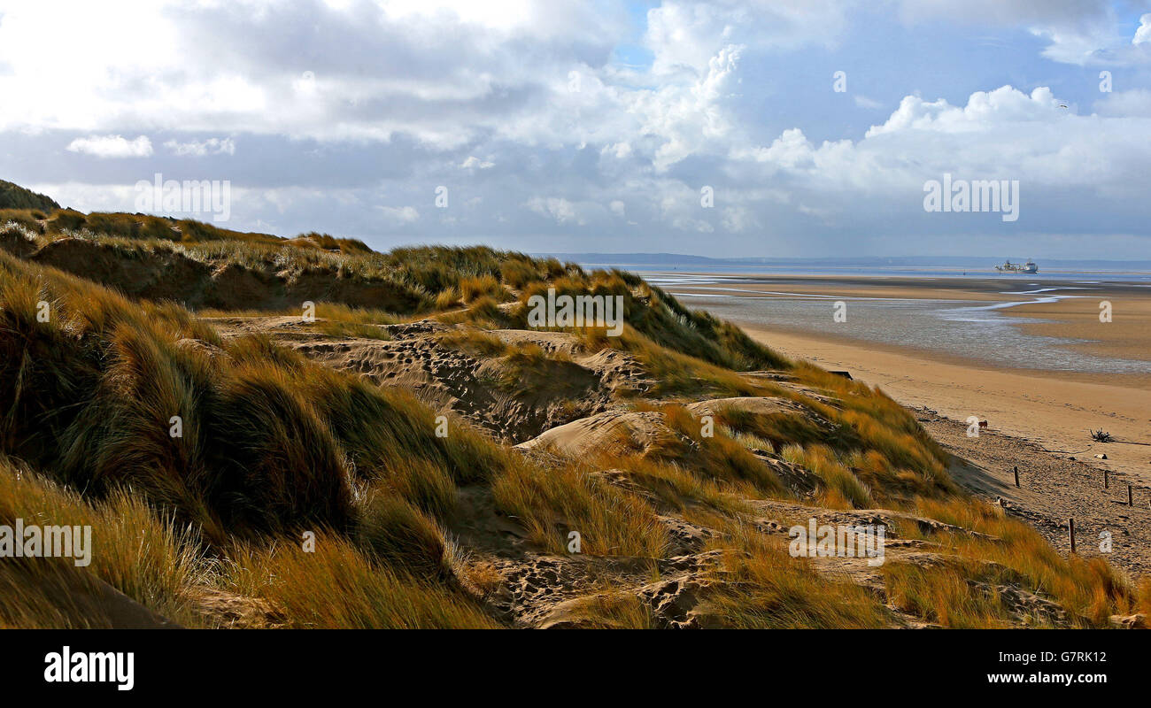 A cargo ship is seen on its way to Liverpool off the coast of Formby ...