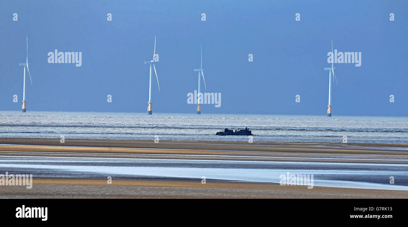 Shipwreck can be seen in the distance on beach hi-res stock photography ...