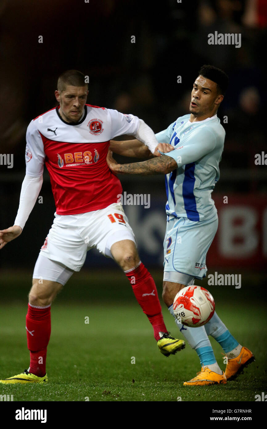 Coventry City's Jordan Willis challenges Fleetwood Town's Jamie Proctor ...