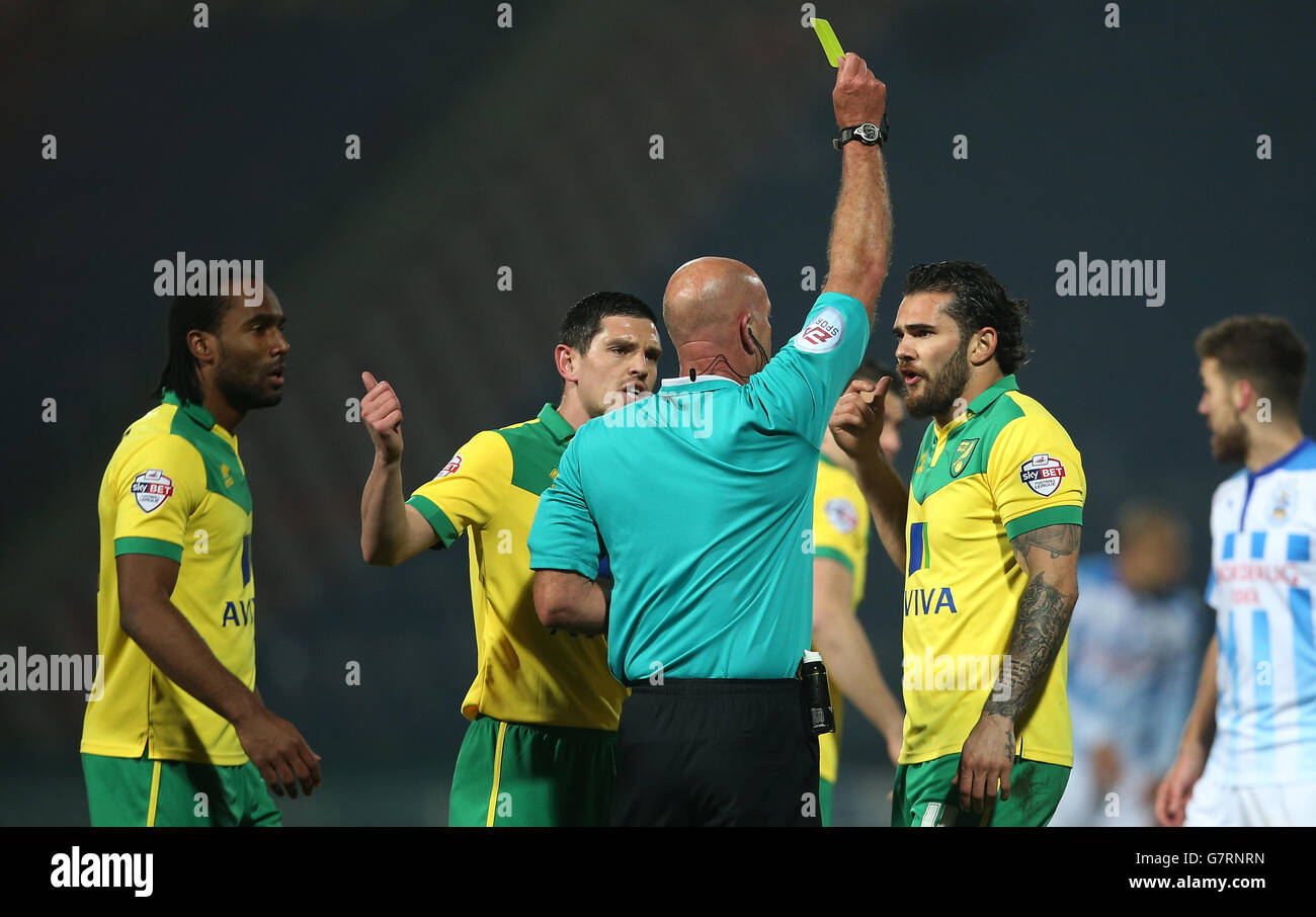 Referee Nigel Miller books Bradley Johnson for using his hand to score ...
