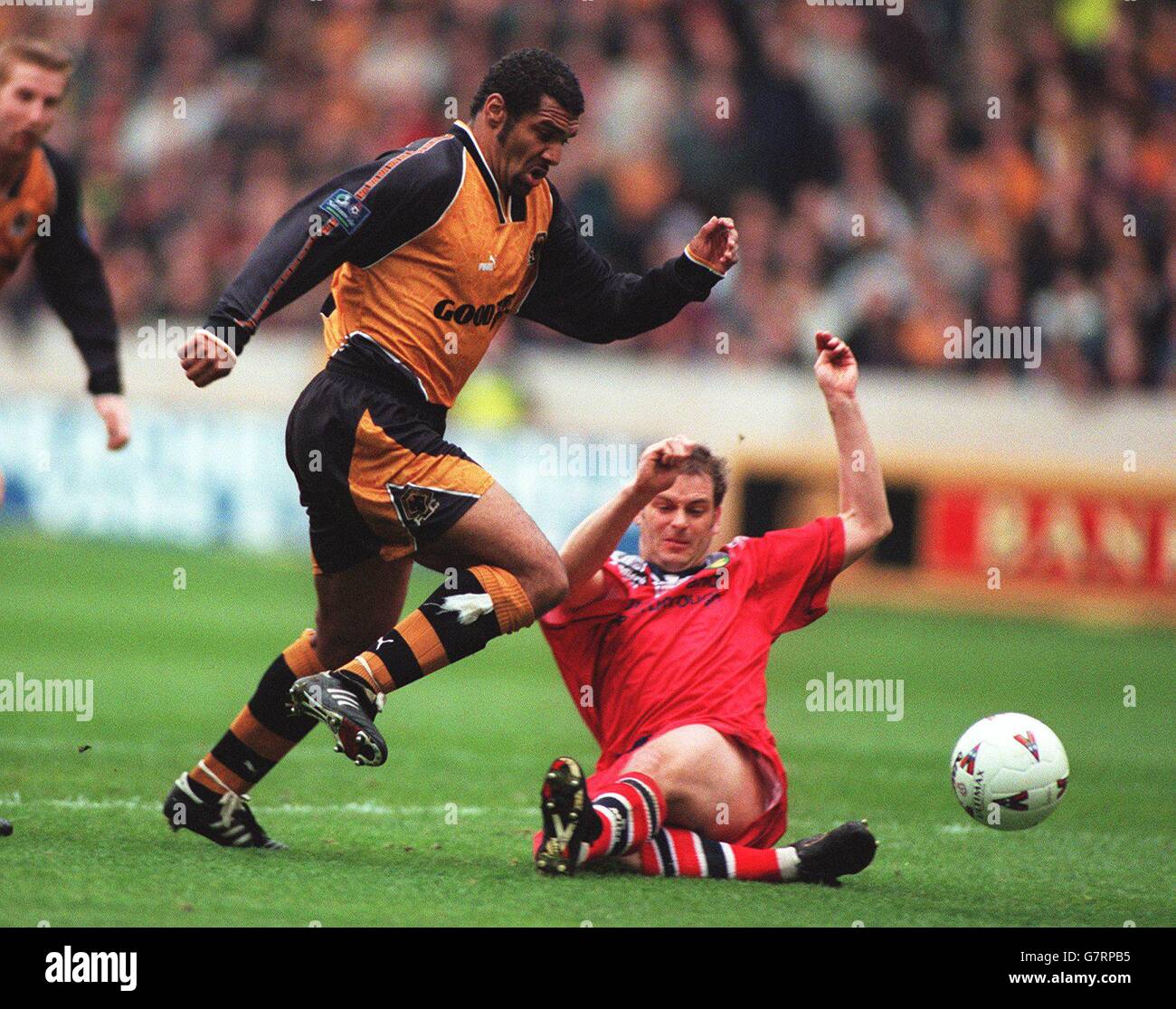 Don Goodman, Wolves is tackled by Carl Bradshaw, Norwich Stock Photo ...