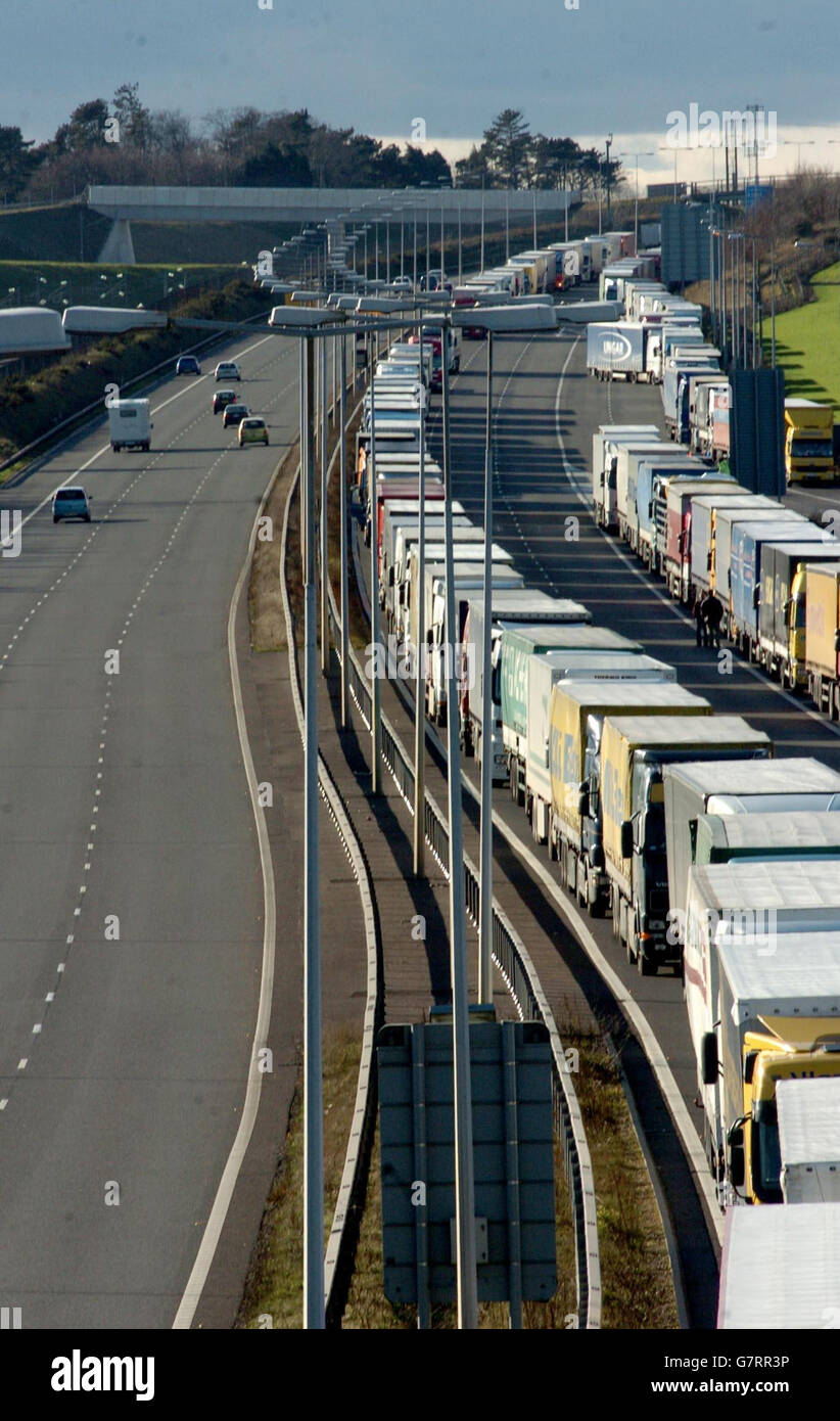 Lorries queue up on the m20 motorway in kent hi-res stock photography ...