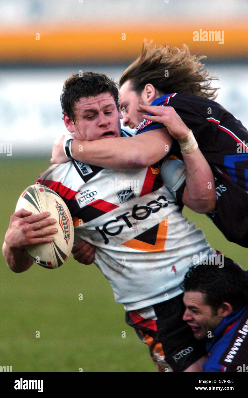 Bradford Bull's Lee Radford tackled by Wakefield Wildcats' David Wrench ...