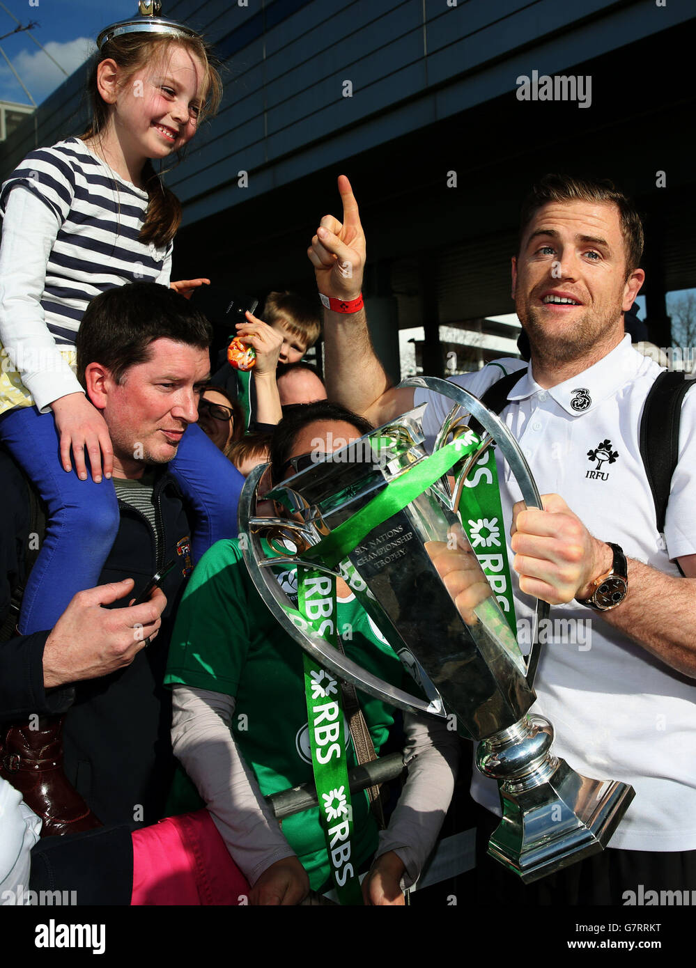 Ireland's Jamie Heaslip shares the trophy with supporters on arrival at ...