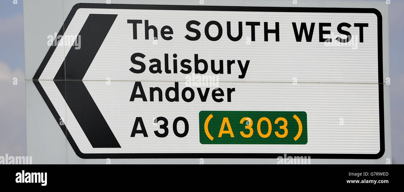 General view of a signpost for the A303 A-road and Thhe South West ...
