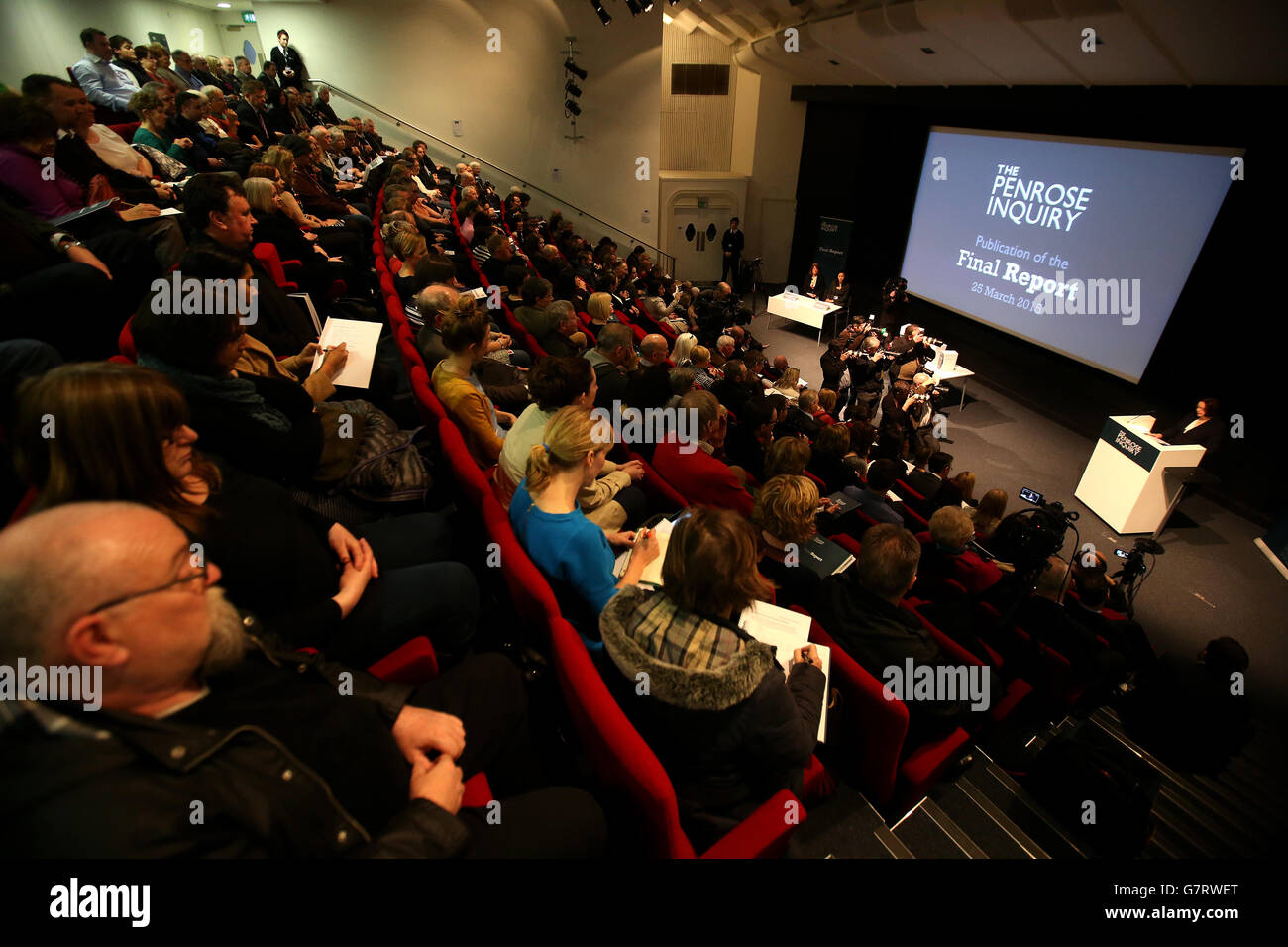 Maria McCann from The Penrose Report team reads the report as it is ...