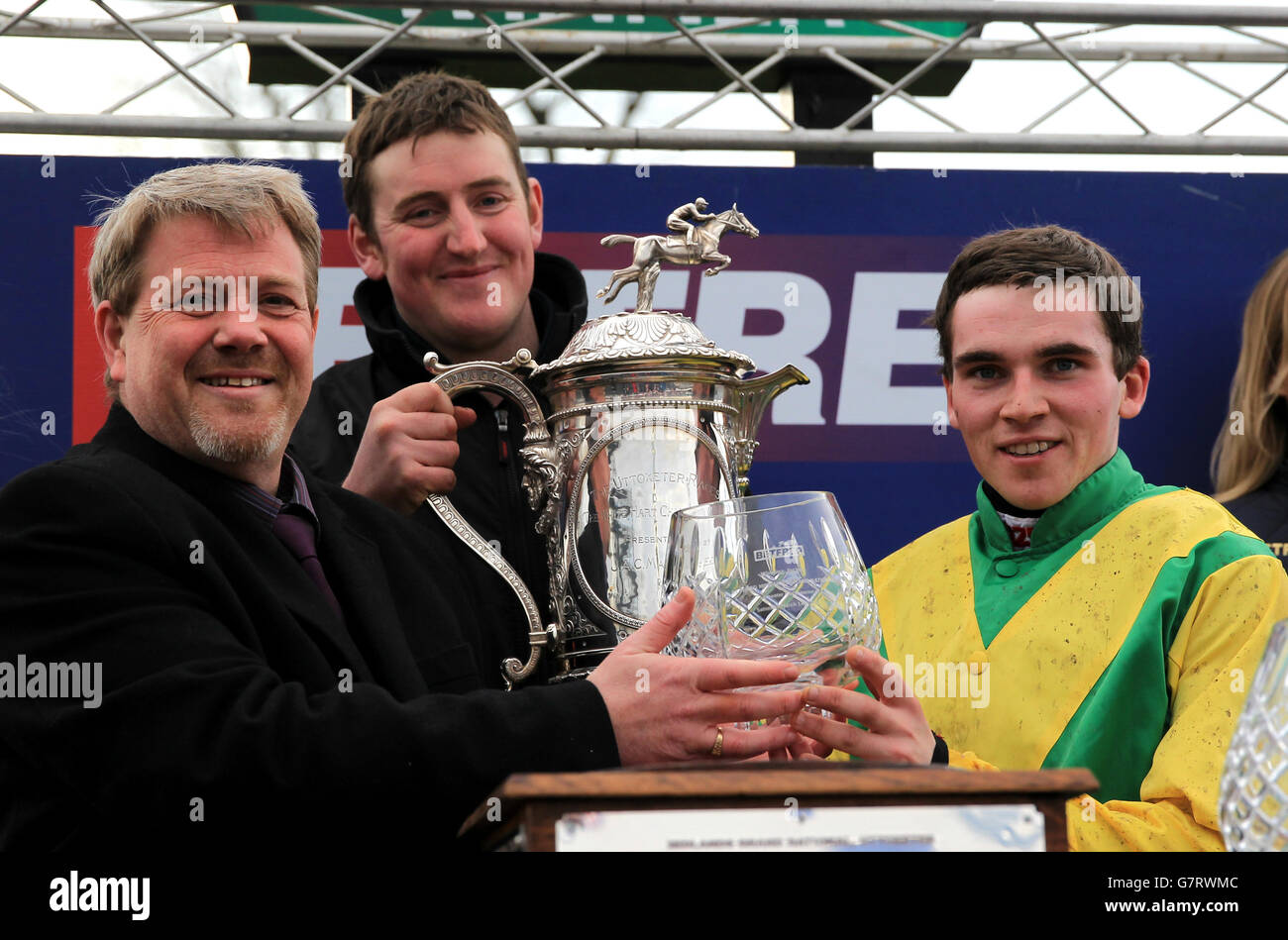 Jonathan Burke celebrates winning The Betfred Midlands Grand National ...