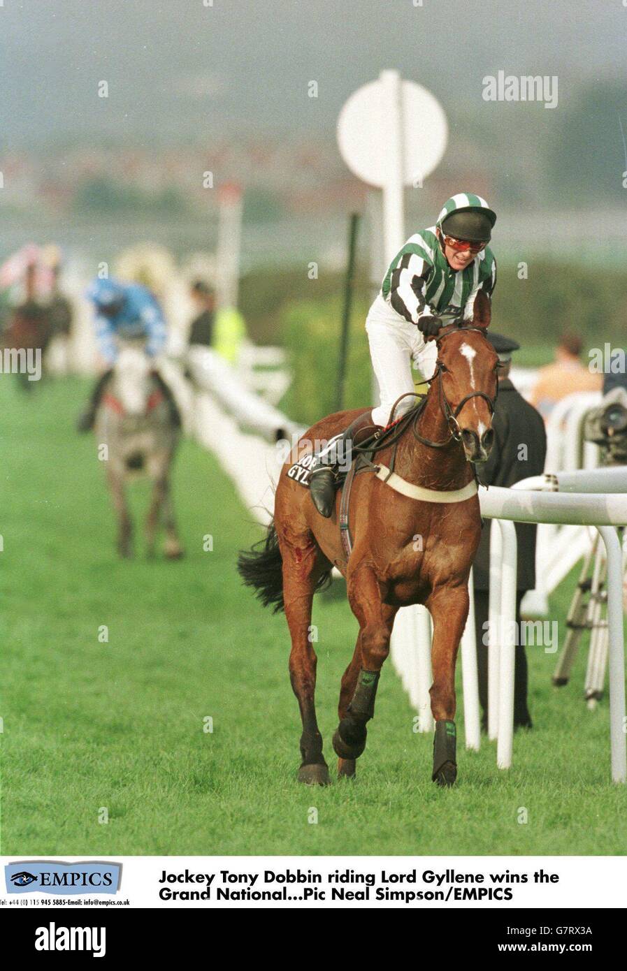 Jockey Tony Dobbin riding Lord Gyllene wins the Grand National Stock ...