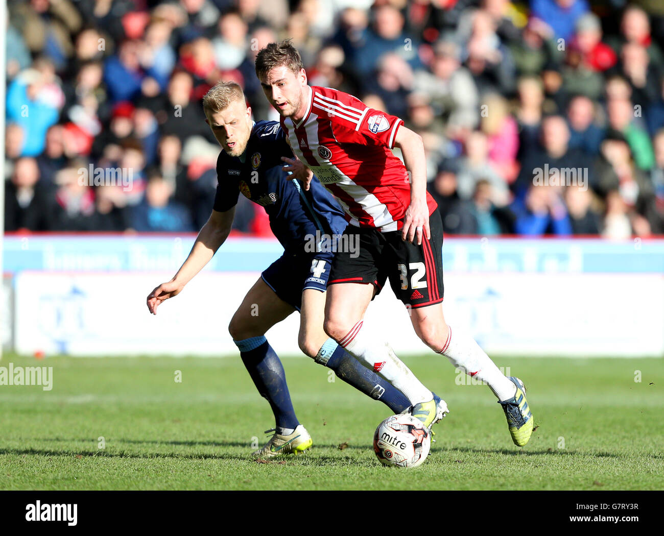 Crewe Alexandra's Harry Davis (left) and Sheffield United's Steven ...