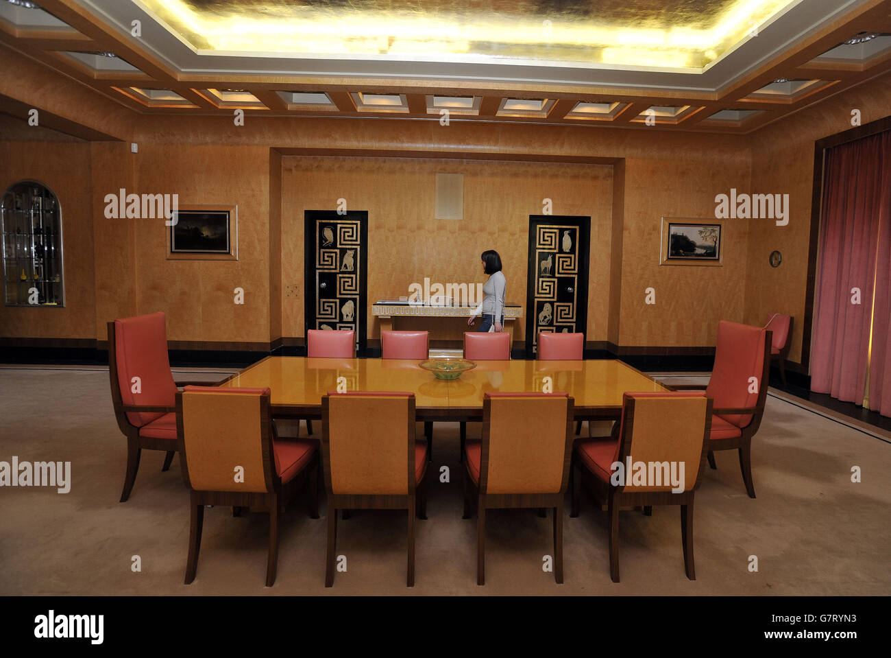 A vistor views the dinning room at Eltham Palace, the 1930s home of ...