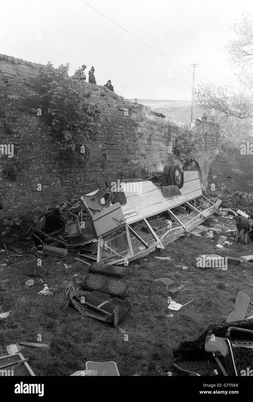 The remains of the almost flattened coach, in which 32 passengers died ...