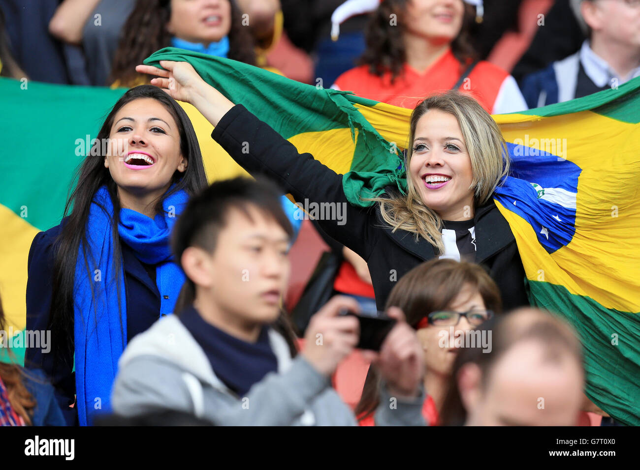 Brazil fans cheer on their side inside the Emirates Stadium before the ...