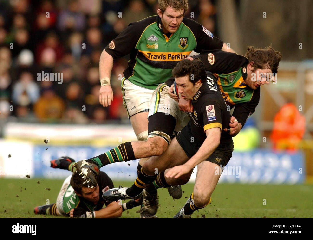 Wasps' Tom Voyce is caught by Northampton's Matt Lord (R Stock Photo ...