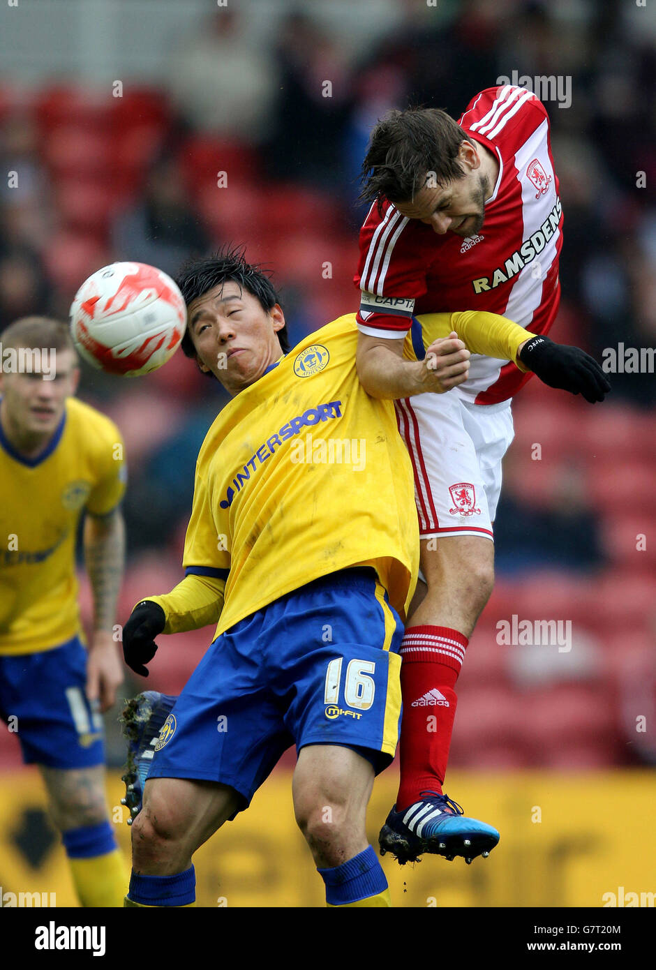 Middlesbrough's Jonathan Woodgate challenges Wigan's Kim Bo-Kyung ...
