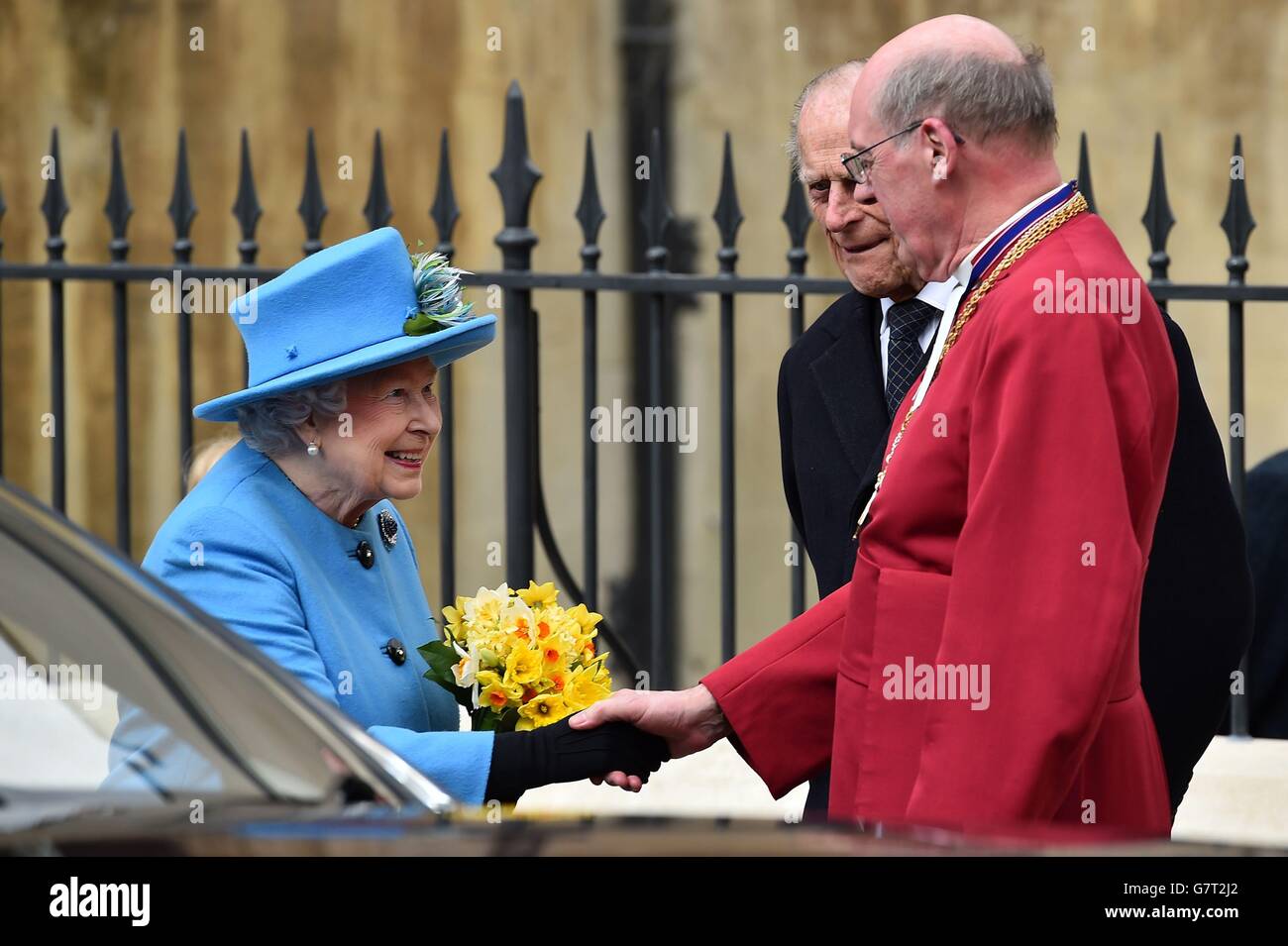Queen Elizabeth II shakes hands with the Rt Revd David Conner as the ...