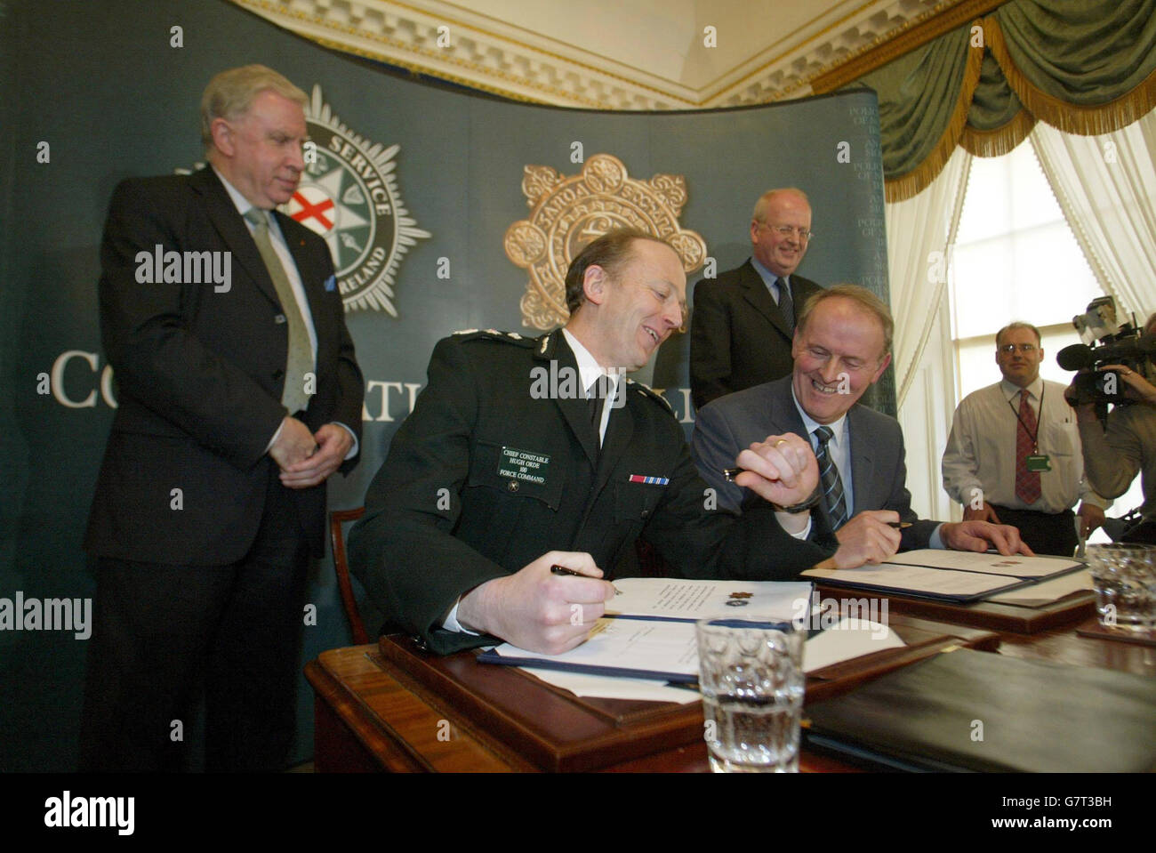 Chief Constable Hugh Orde (second left) and Garda Commissioner Noel ...