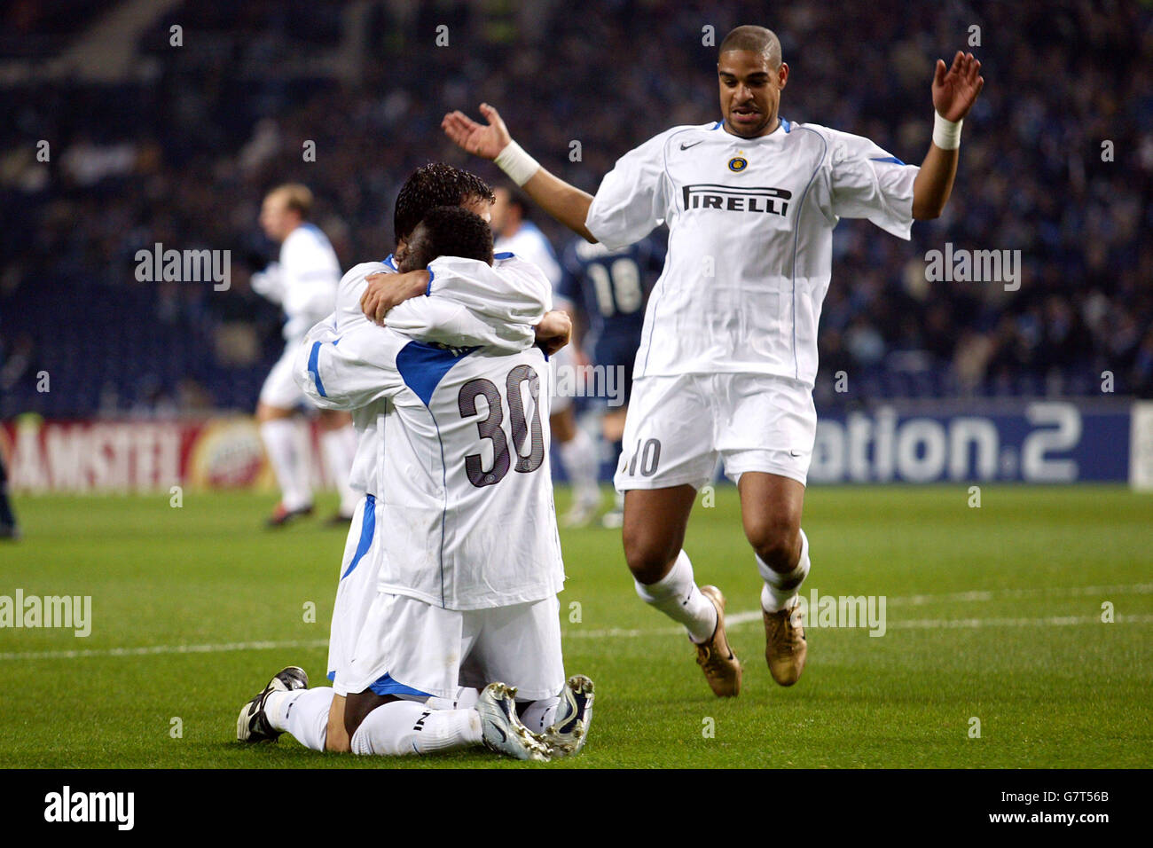 Inter Milan's Adriano joins in the goal celebration of scorer Obafemi ...