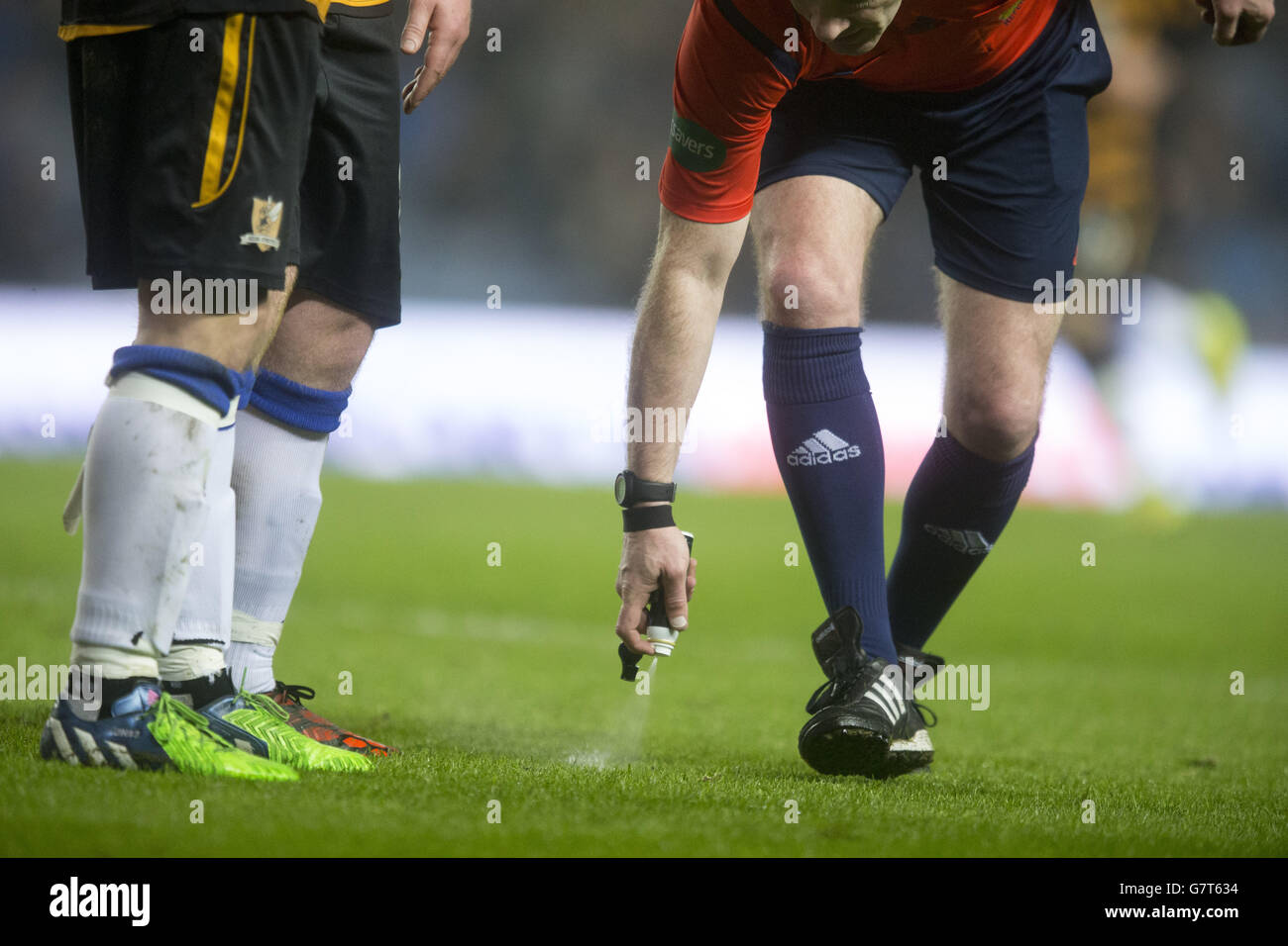 Referee vanishing spray during the Scottish Championship match at Ibrox ...