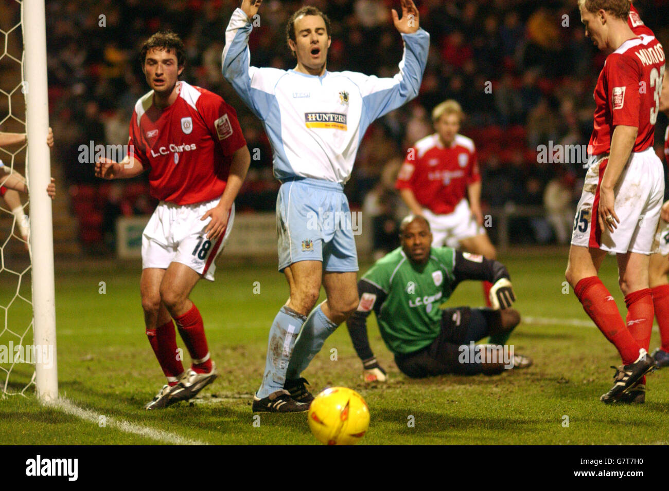 Crewe Alexandra's Clayton Ince looks on as Burnley's Graham Branch sees ...