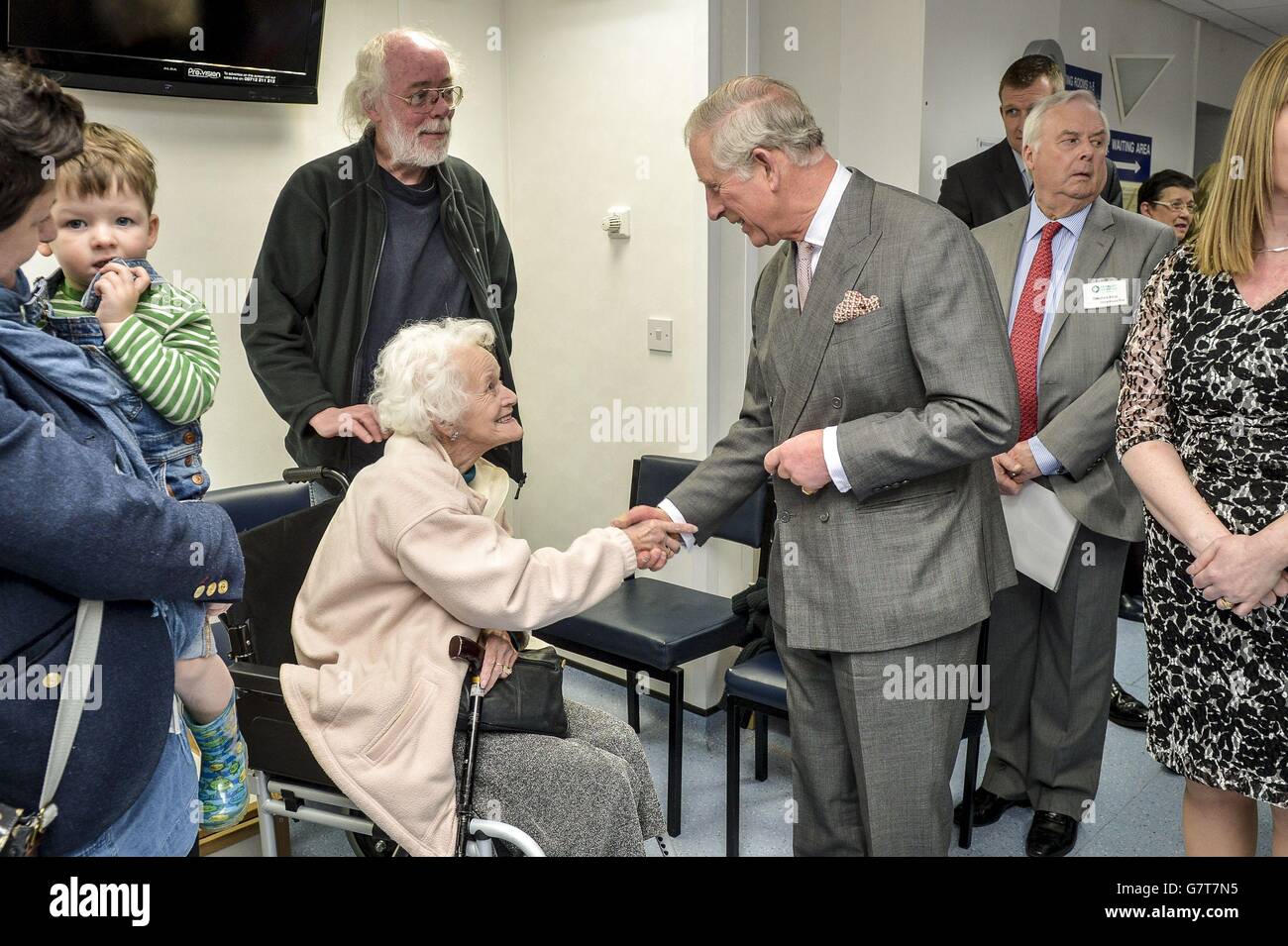 The Prince of Wales meets with patient Alwyn Brown, 89, during his ...