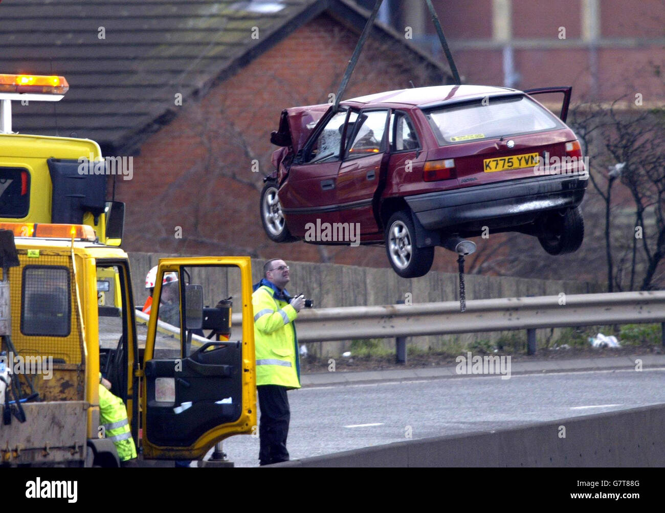 A Vauxhall Astra car is removed from the westlink. Two people were in ...