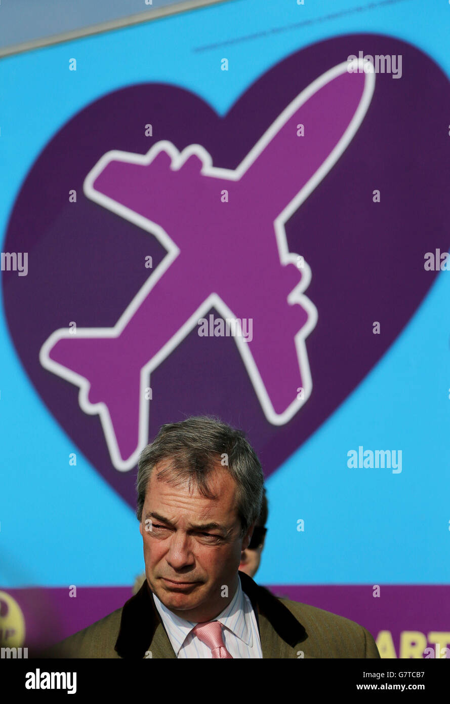 Ukip Leader Nigel Farage unveils a campaign poster as he visits Heli ...