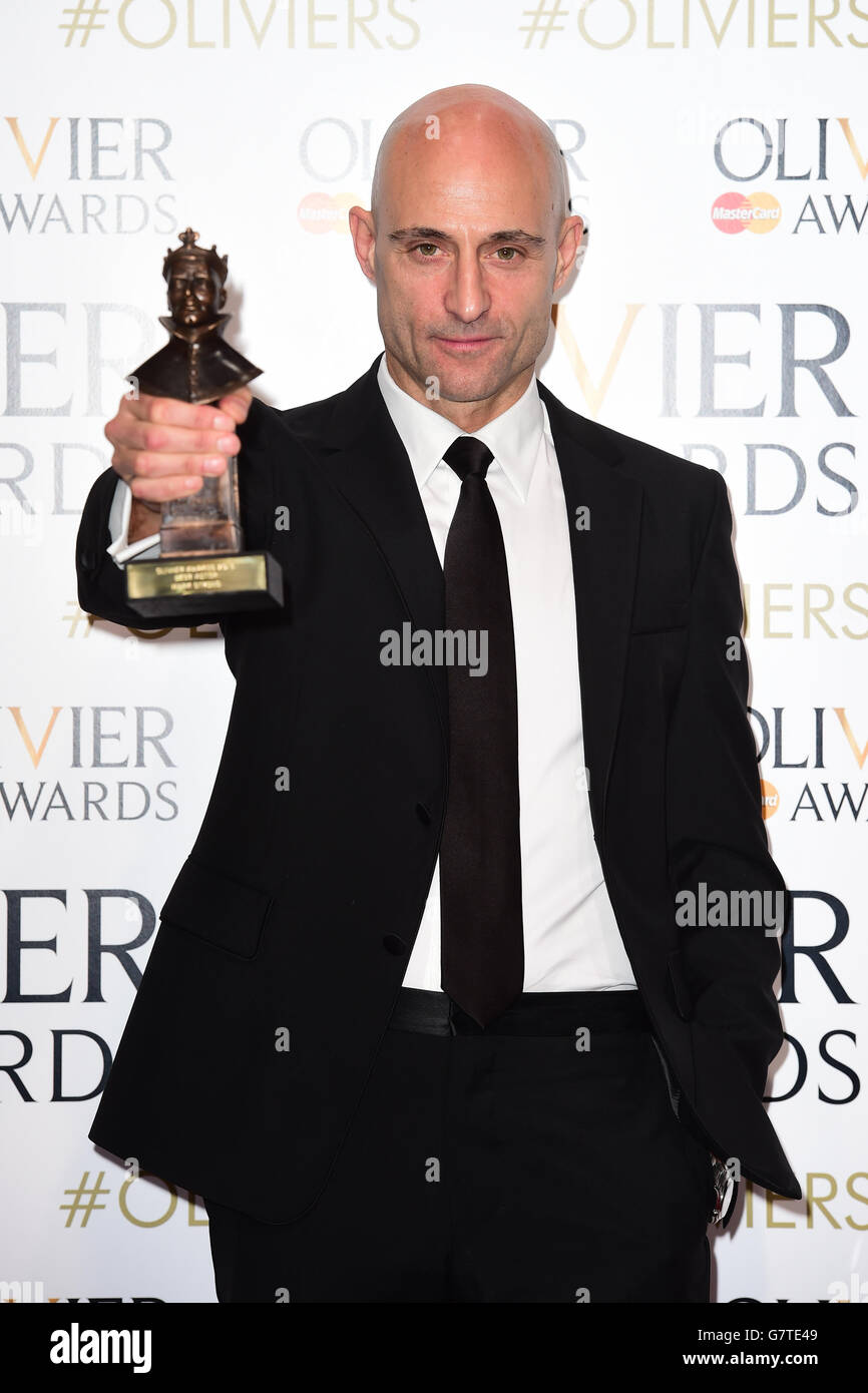 Mark Strong with the Olivier Award for Best Actor attending the Olivier ...