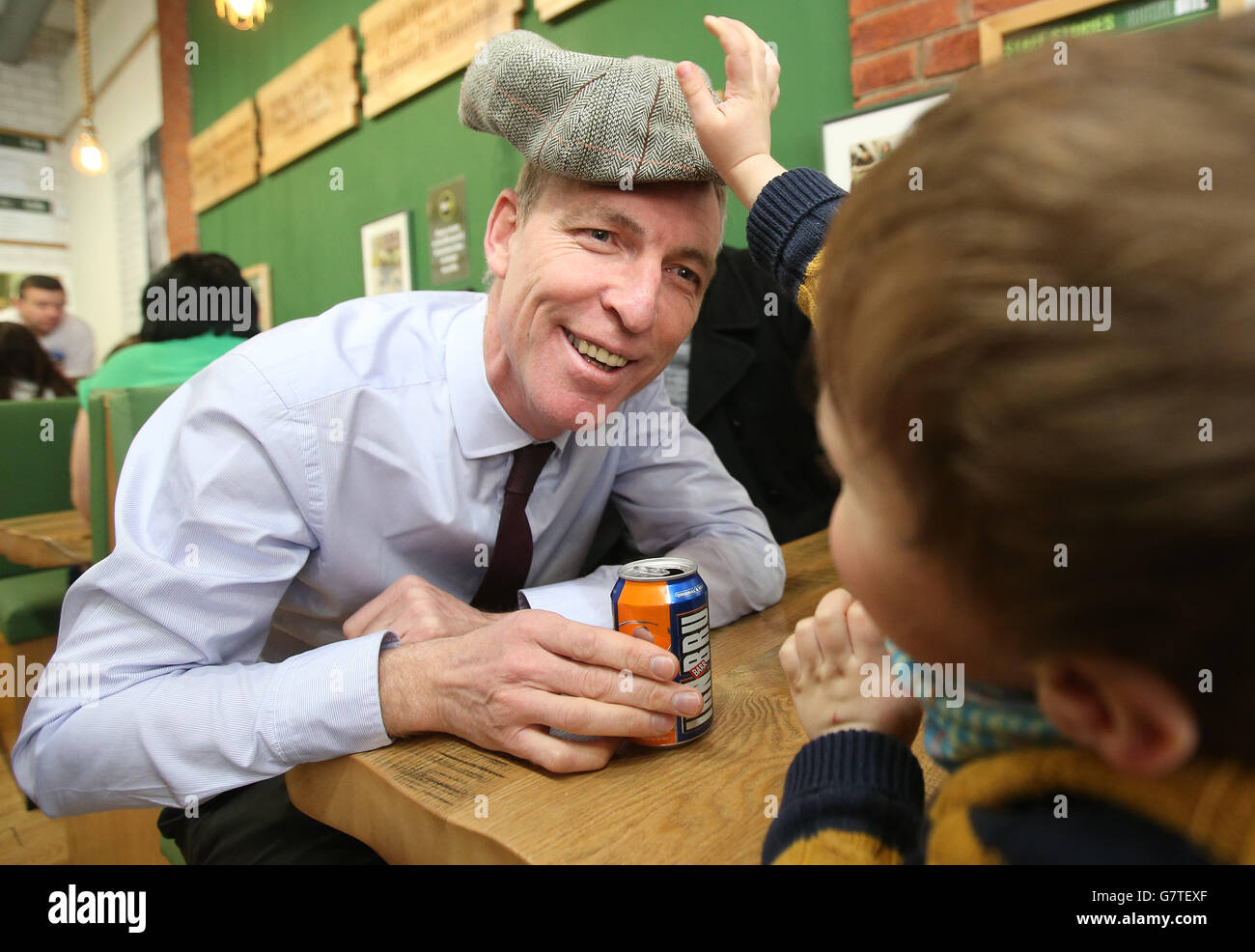 Scottish Labour leader Jim Murphy tries on a flat cap as he meets 3 ...