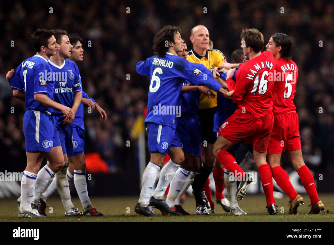 Tempers flare as referee Steve Bennett attempts calm things down Stock ...