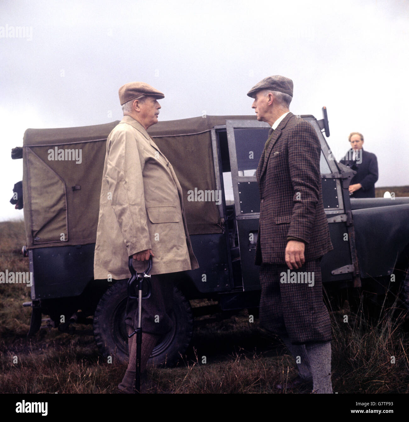 Mr. Harold Macmillan (l) pictured during the first days grouse shooting ...