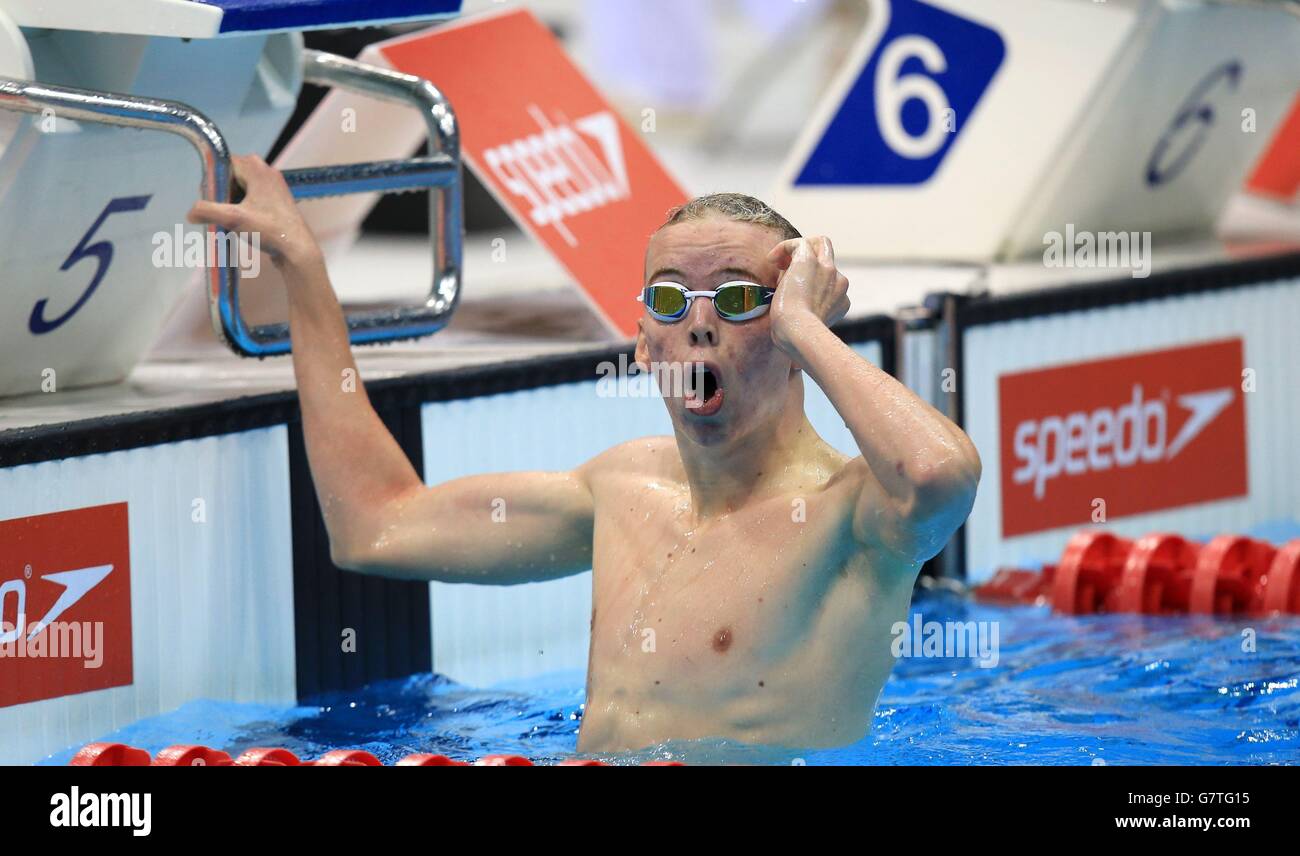Lewis Clough celebrates winning the men's junior EG 100m freestyle ...